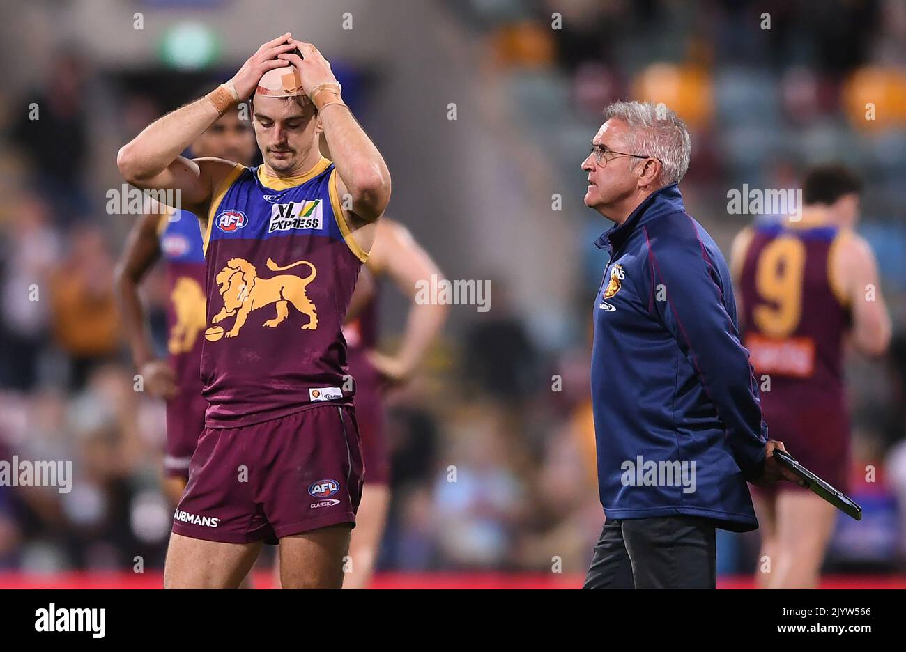 Jarryd Lyons (left) and Lions coach Chris Fagan react after full-time ...