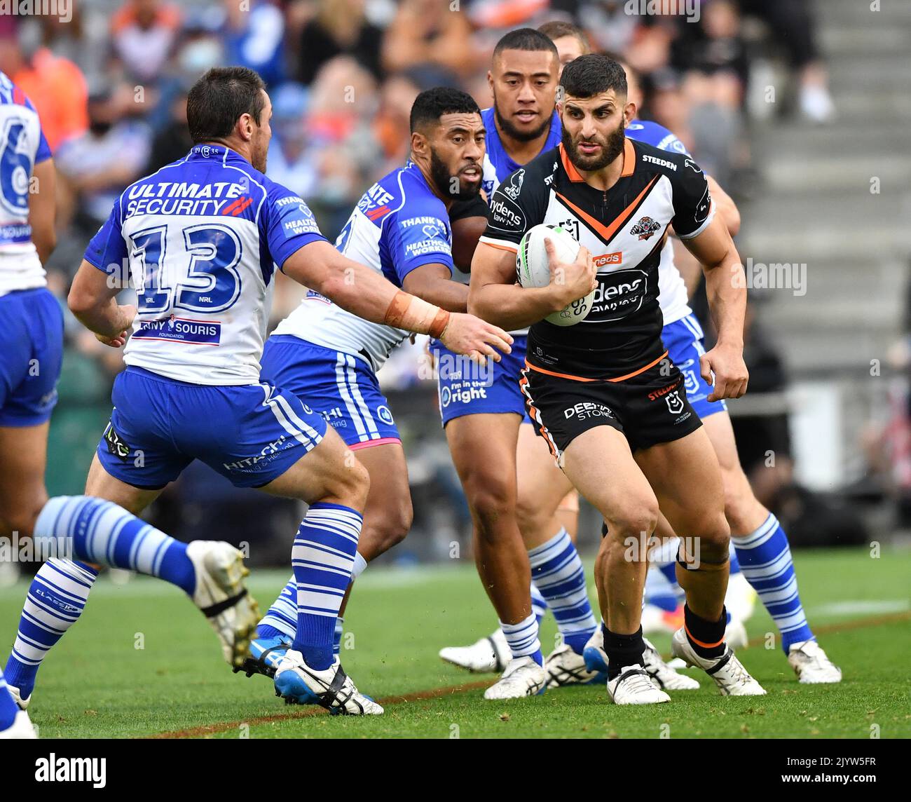 Alex Twal (right) of the Tigers in action during the Round 25 NRL match ...