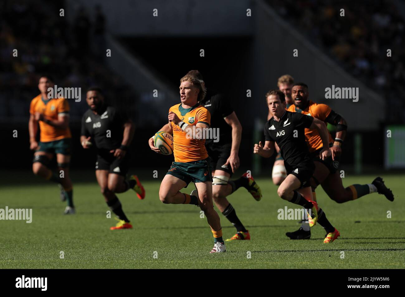 Tate McDermott of the Wallabies runs the ball during the Rugby Union ...