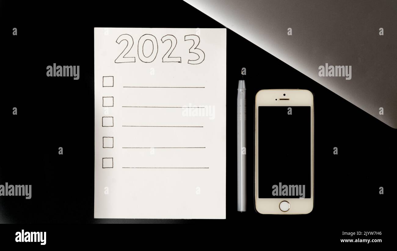 Checklist for the 2023 new year, make a plan on the desktop Stock Photo ...