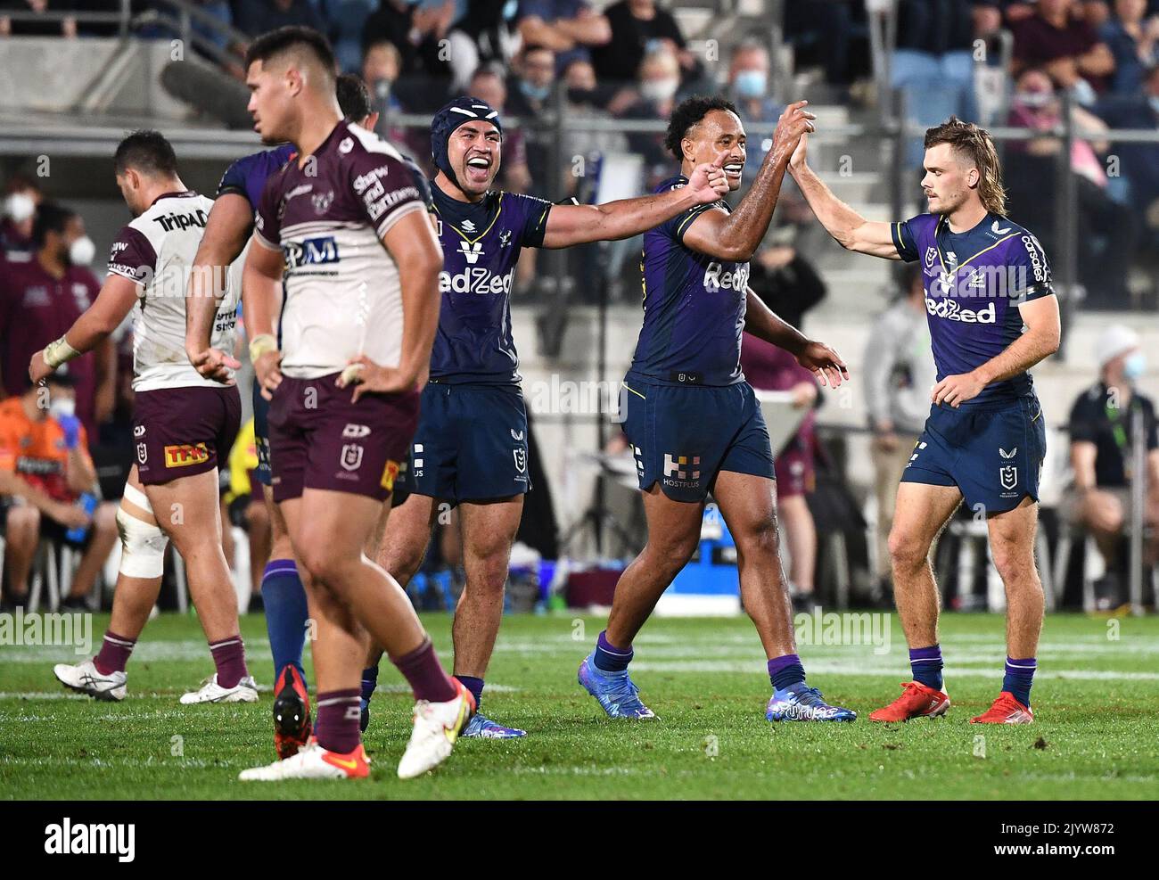 Storm players celebrate following the NRL Qualifying Final match ...