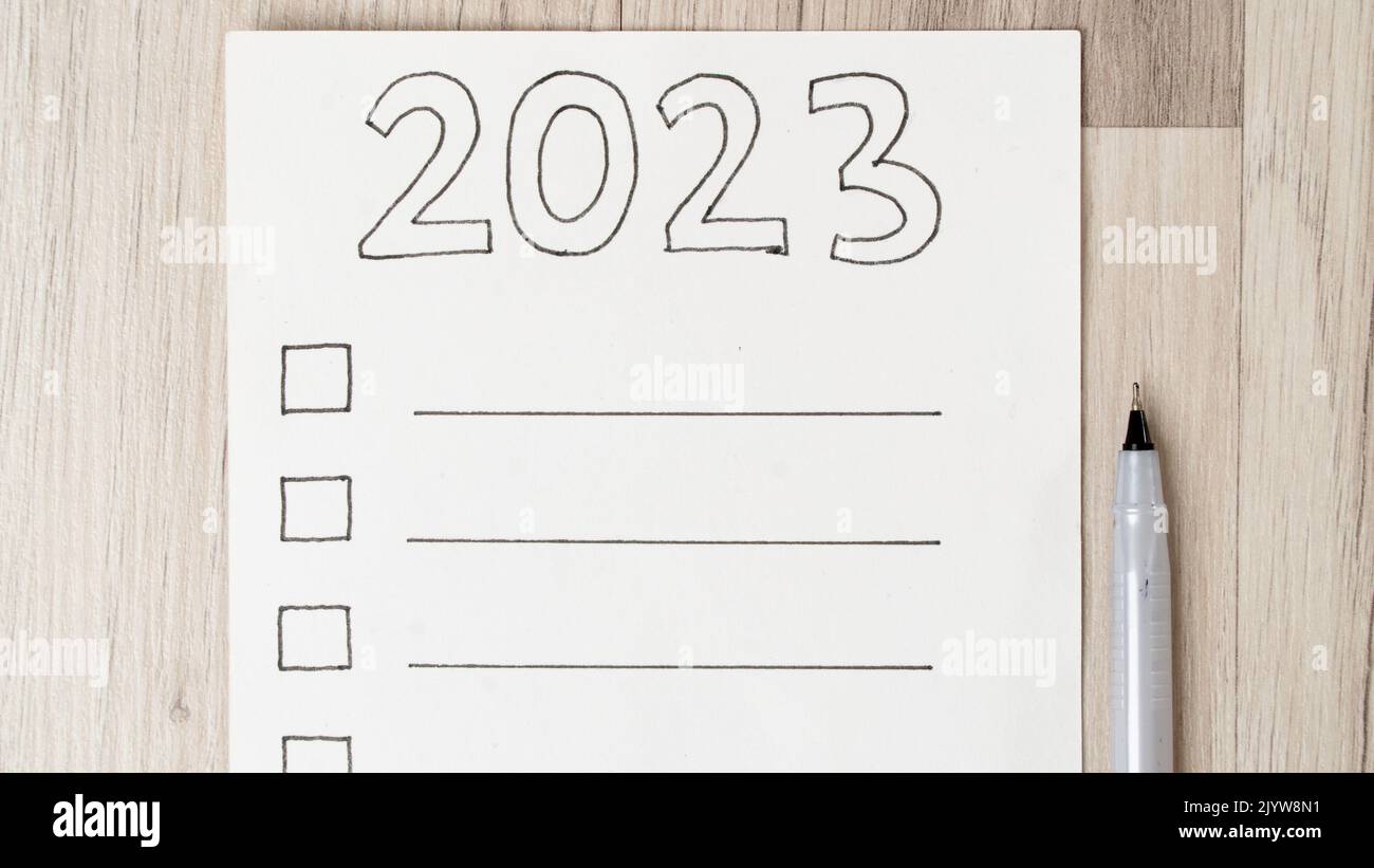 To-do list for 2023 on a white sheet with squares for checkmarks and ...