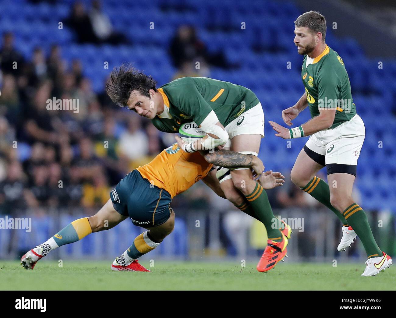 Quade Cooper of Australia Wallabies tackles Ox Nché of the South Africa ...