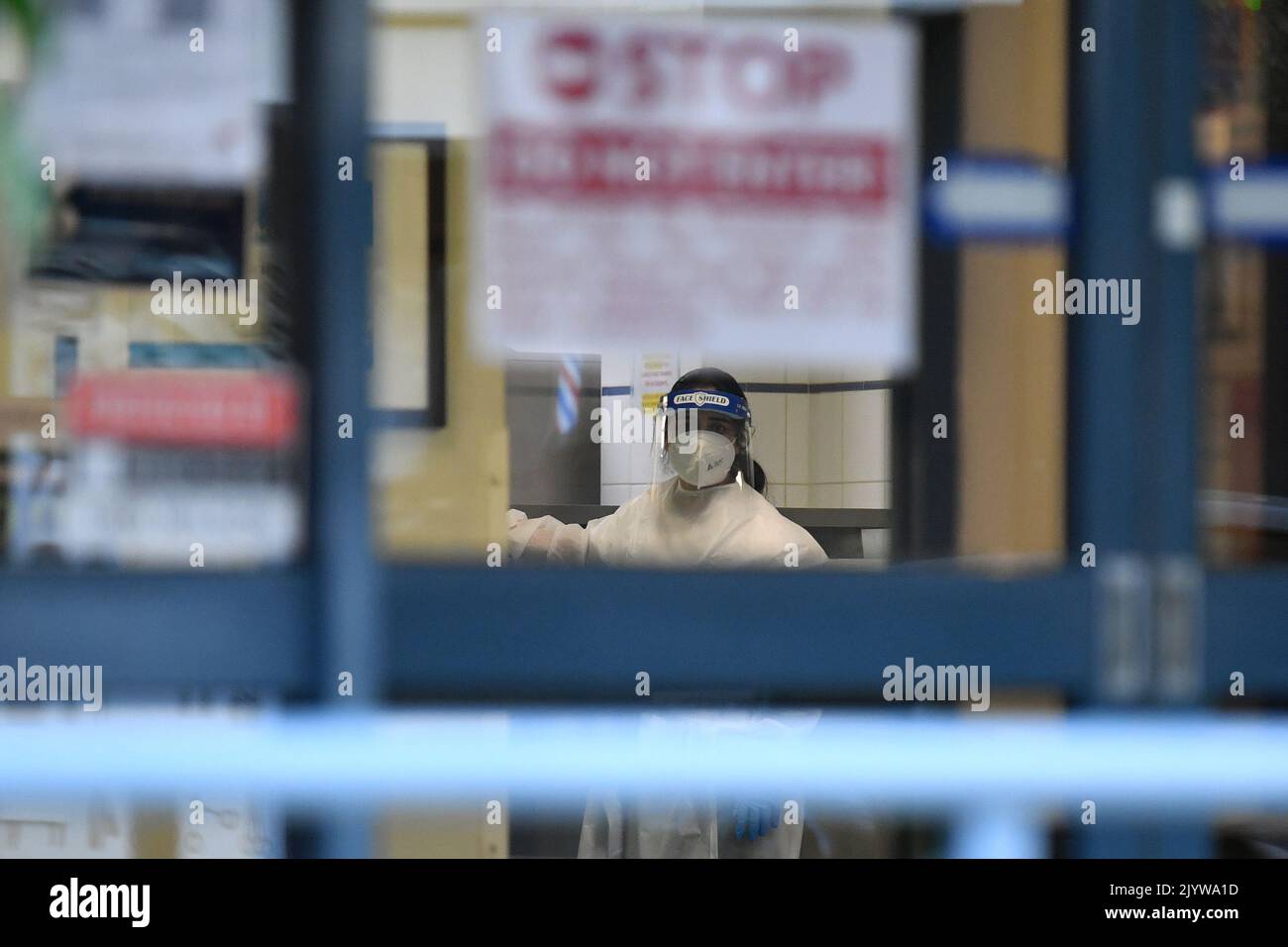 Staff wearing personal protective equipment at the St Vincent de Paul ...