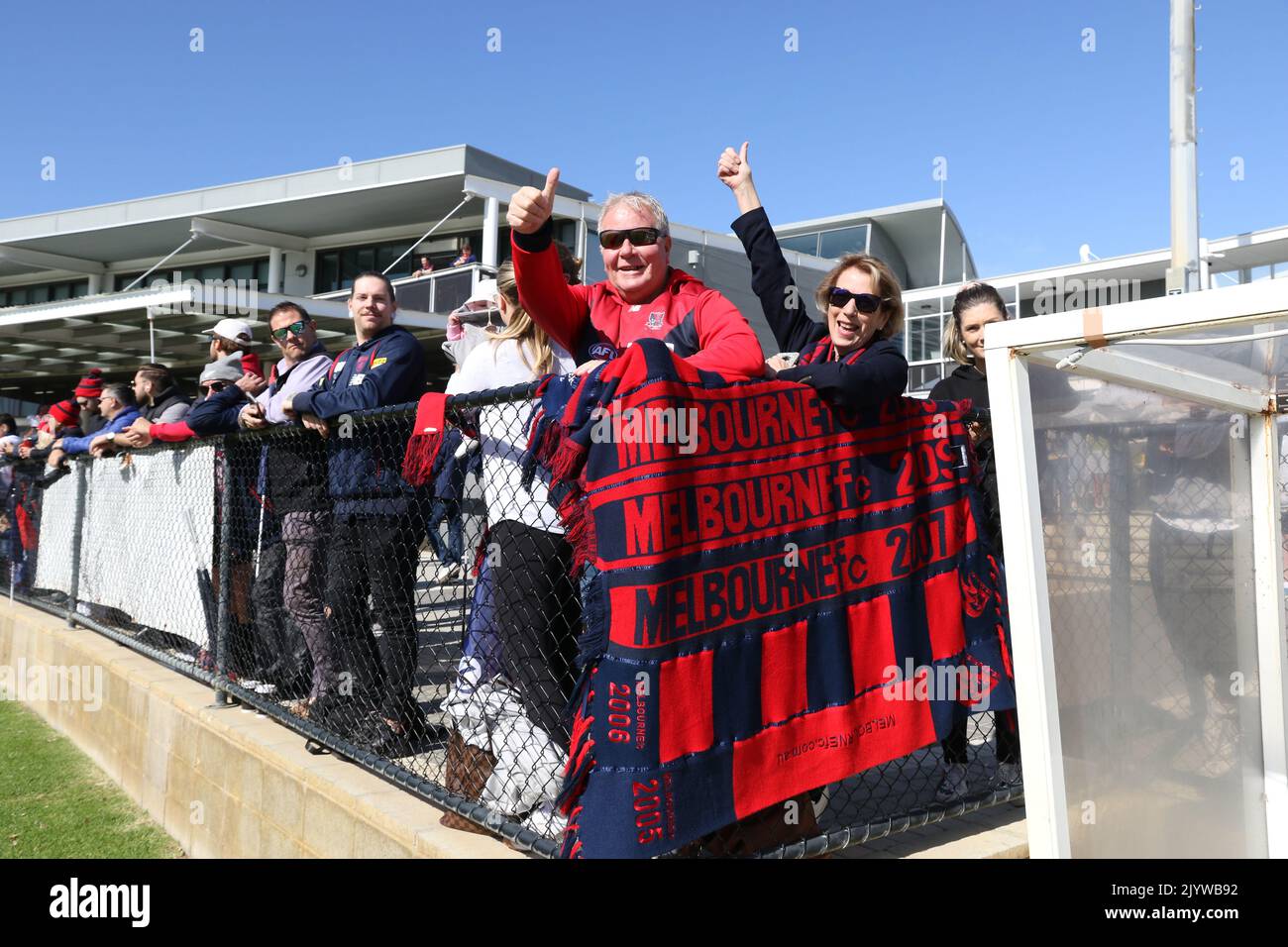 Fans cheering on the Melbourne Demons during their training session at ...