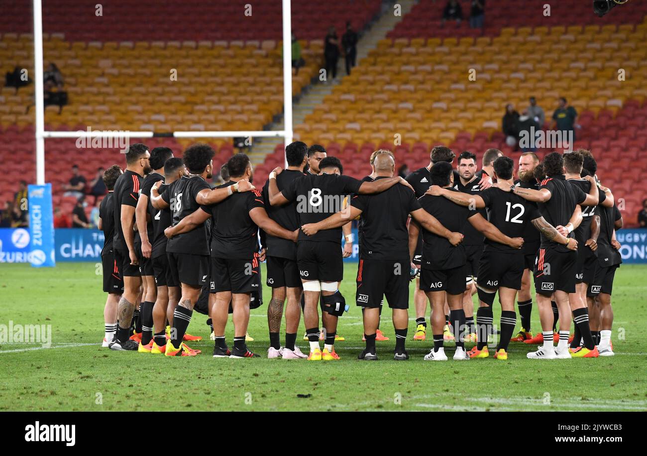 All Blacks players are seen in a huddle after winning the Round 4 Rugby ...