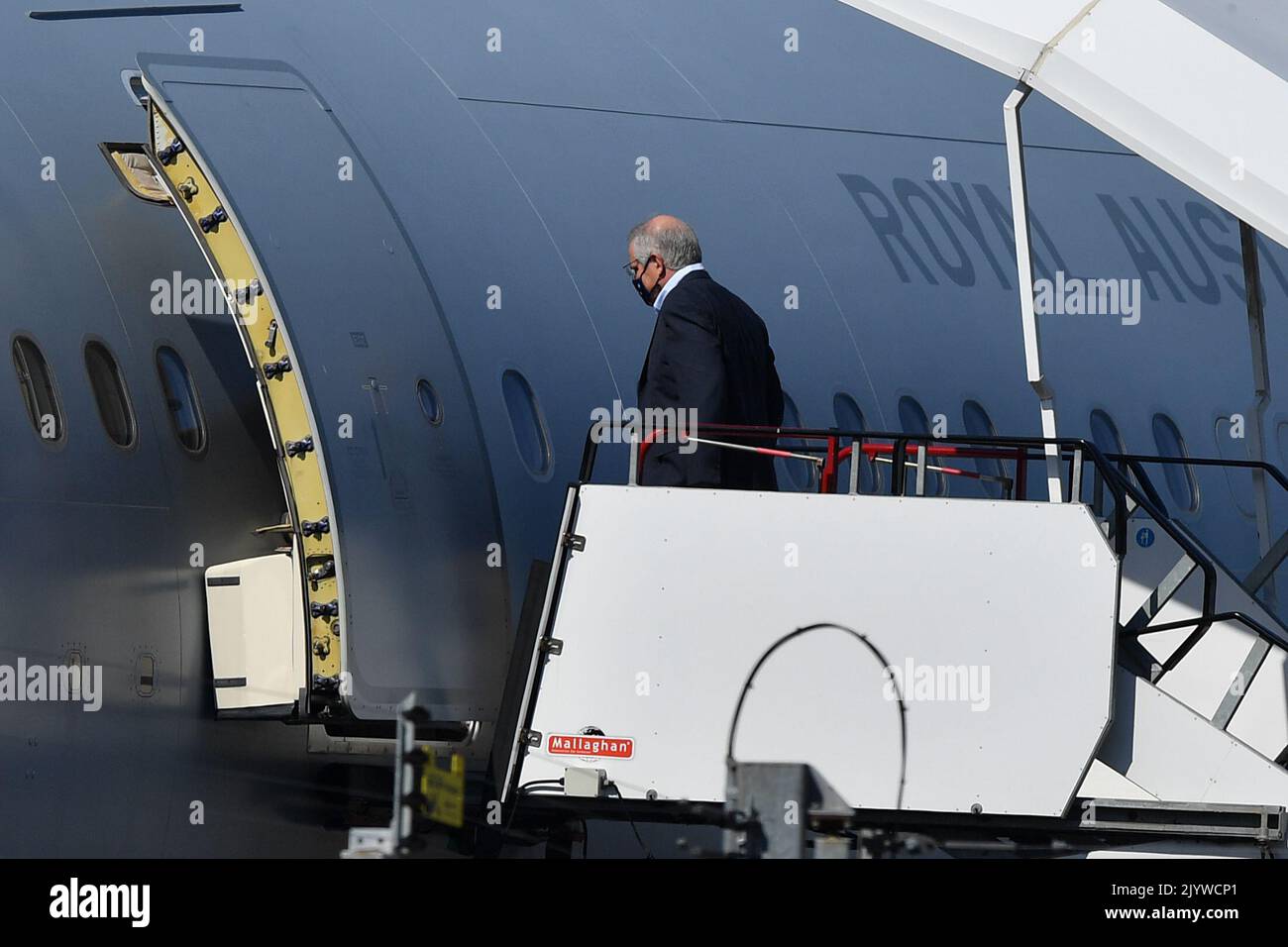 Australian Prime Minister Scott Morrison boards a Royal Australian ...