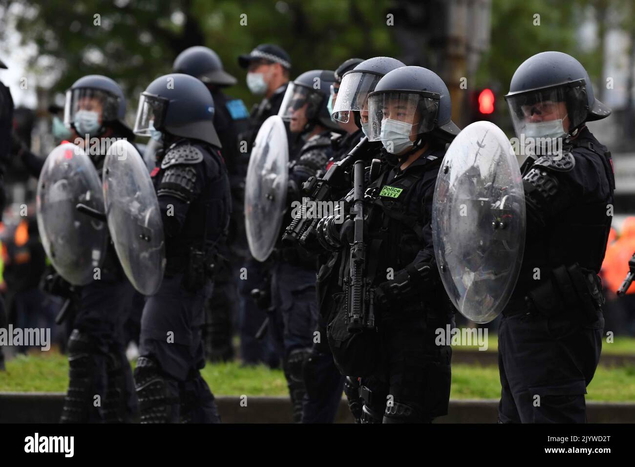 Police in riot gear are seen at a protest at Construction, Forestry ...