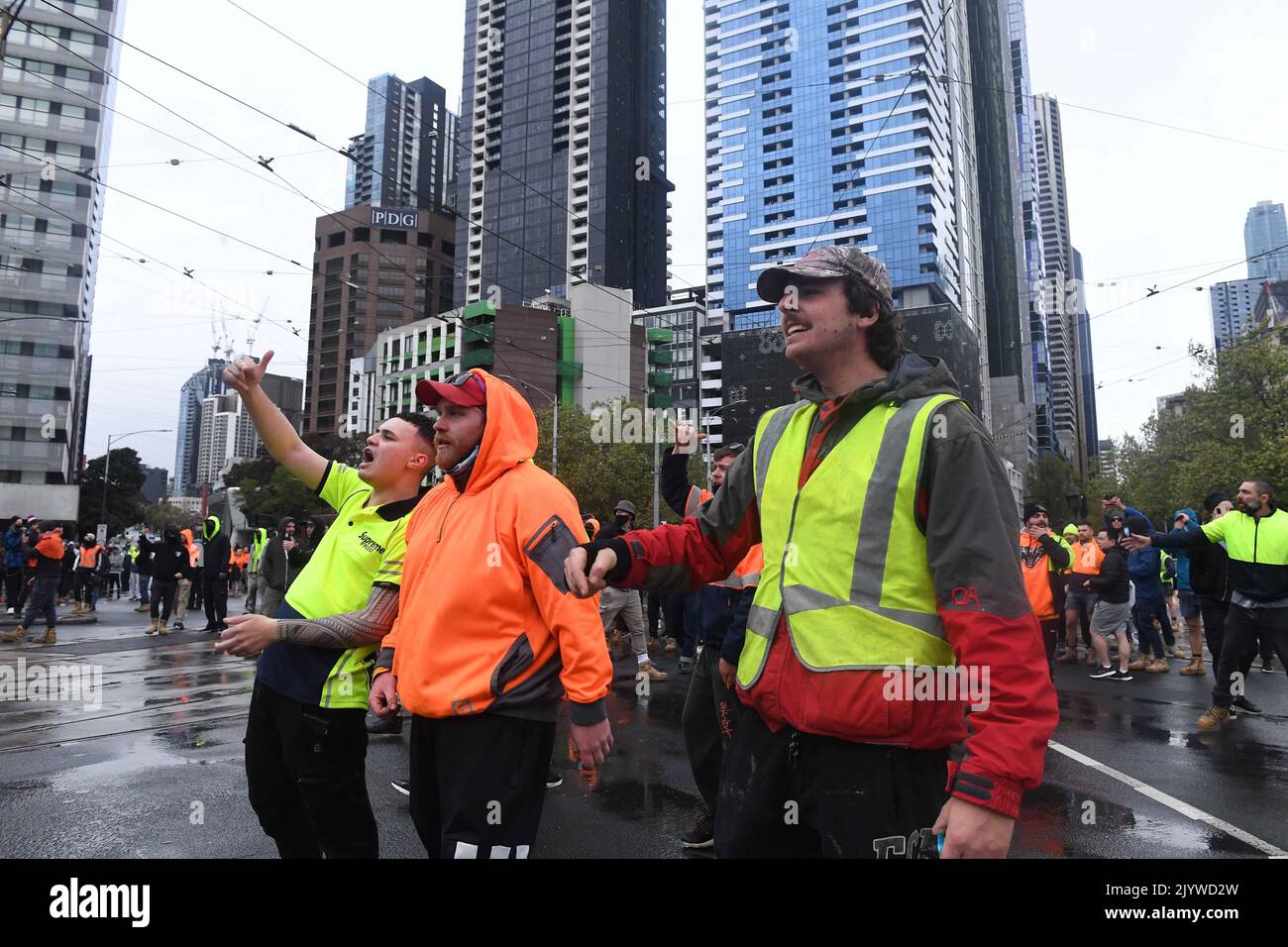 Construction workers are seen at a protest at Construction, Forestry ...