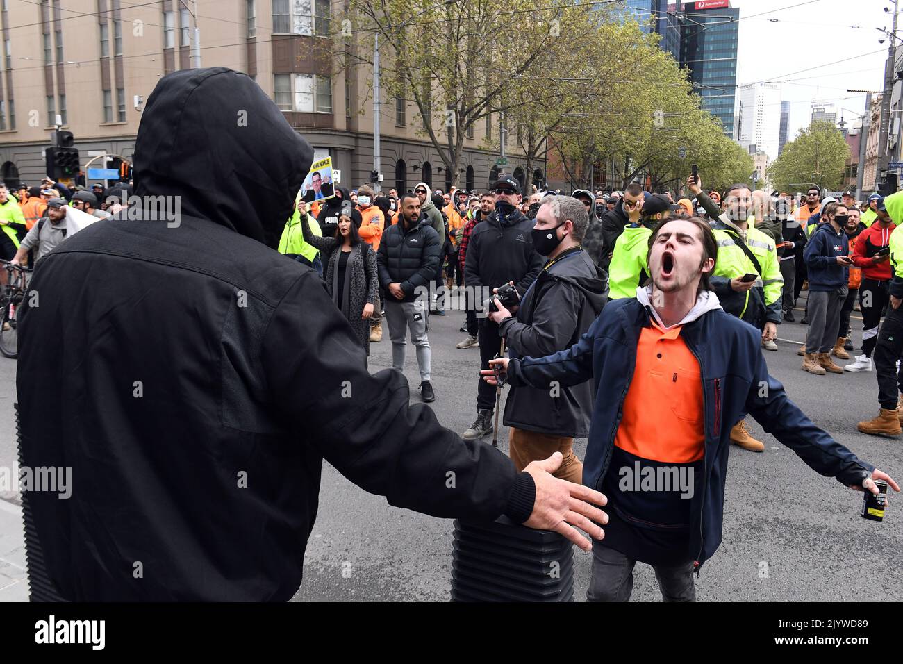Construction workers are seen at a CFMEU protest outside Victoria’s ...