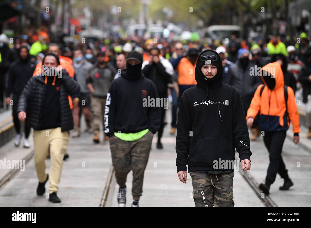 Construction workers are seen at a CFMEU protest outside Victoria’s ...