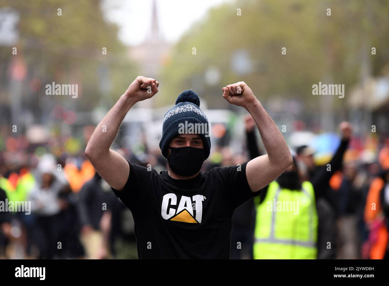 Construction workers are seen at a CFMEU protest outside Victoria’s ...