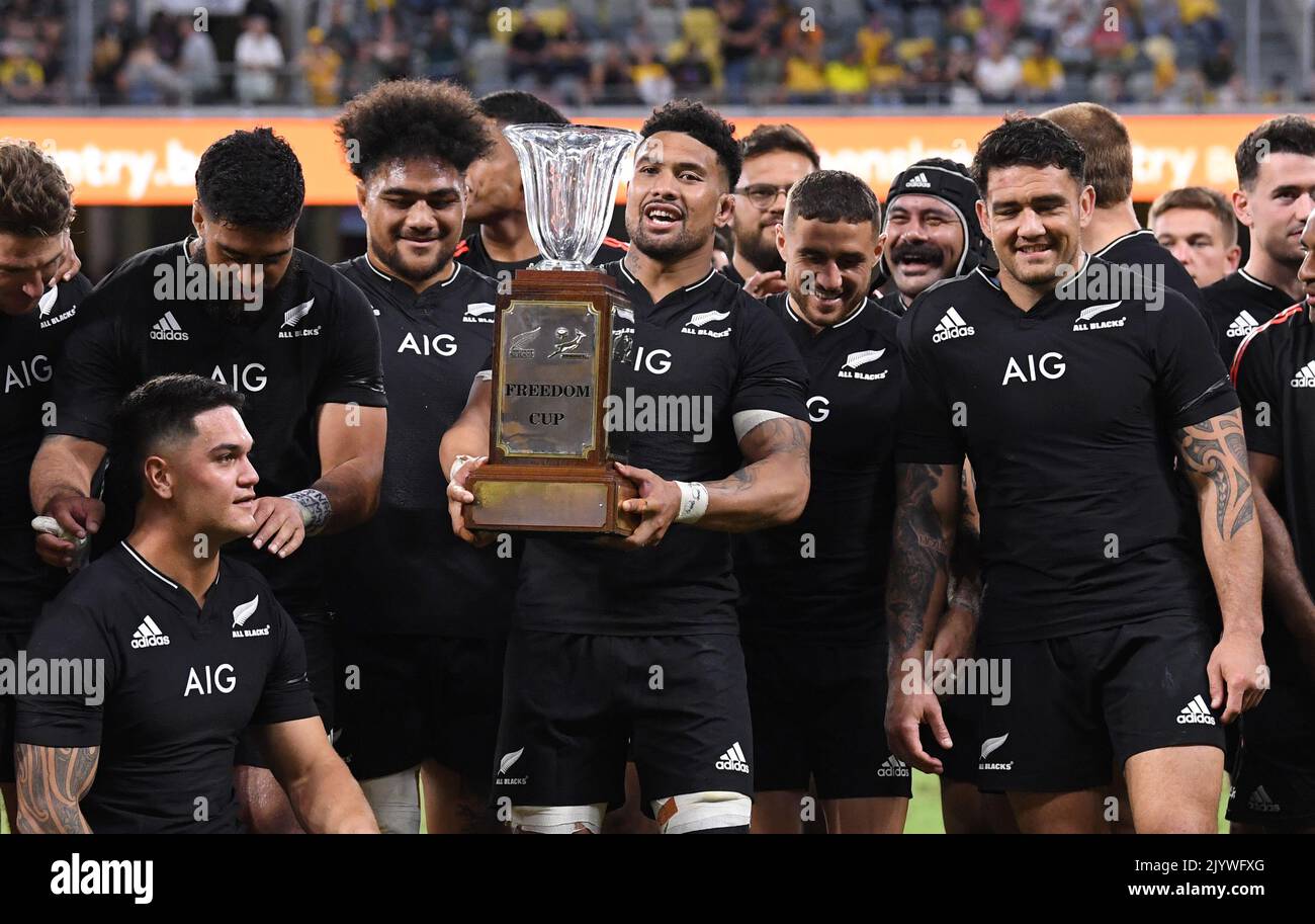 Ardie Savea (centre) of the All Blacks and his team mates celebrate ...