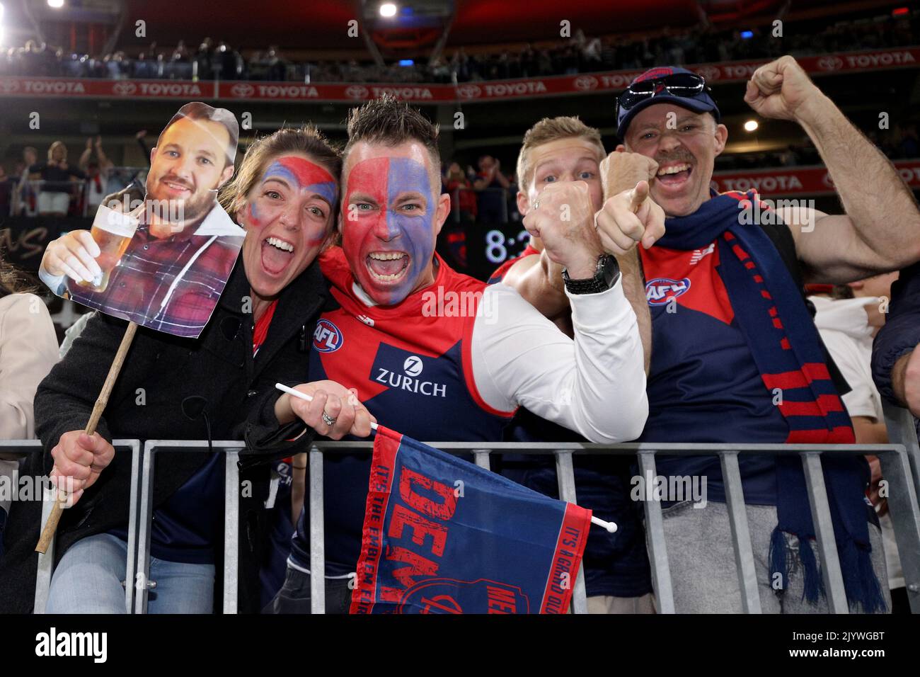 Demons fans celebrate after winning the AFL Grand Final match between ...