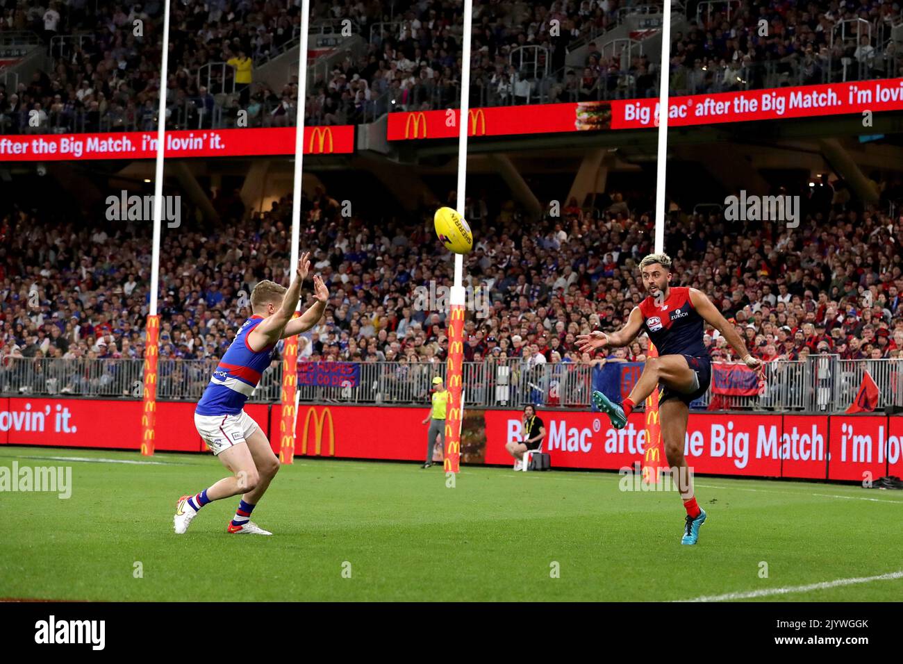 Christian Salem of the Demons kicks the ball during the AFL Grand Final ...