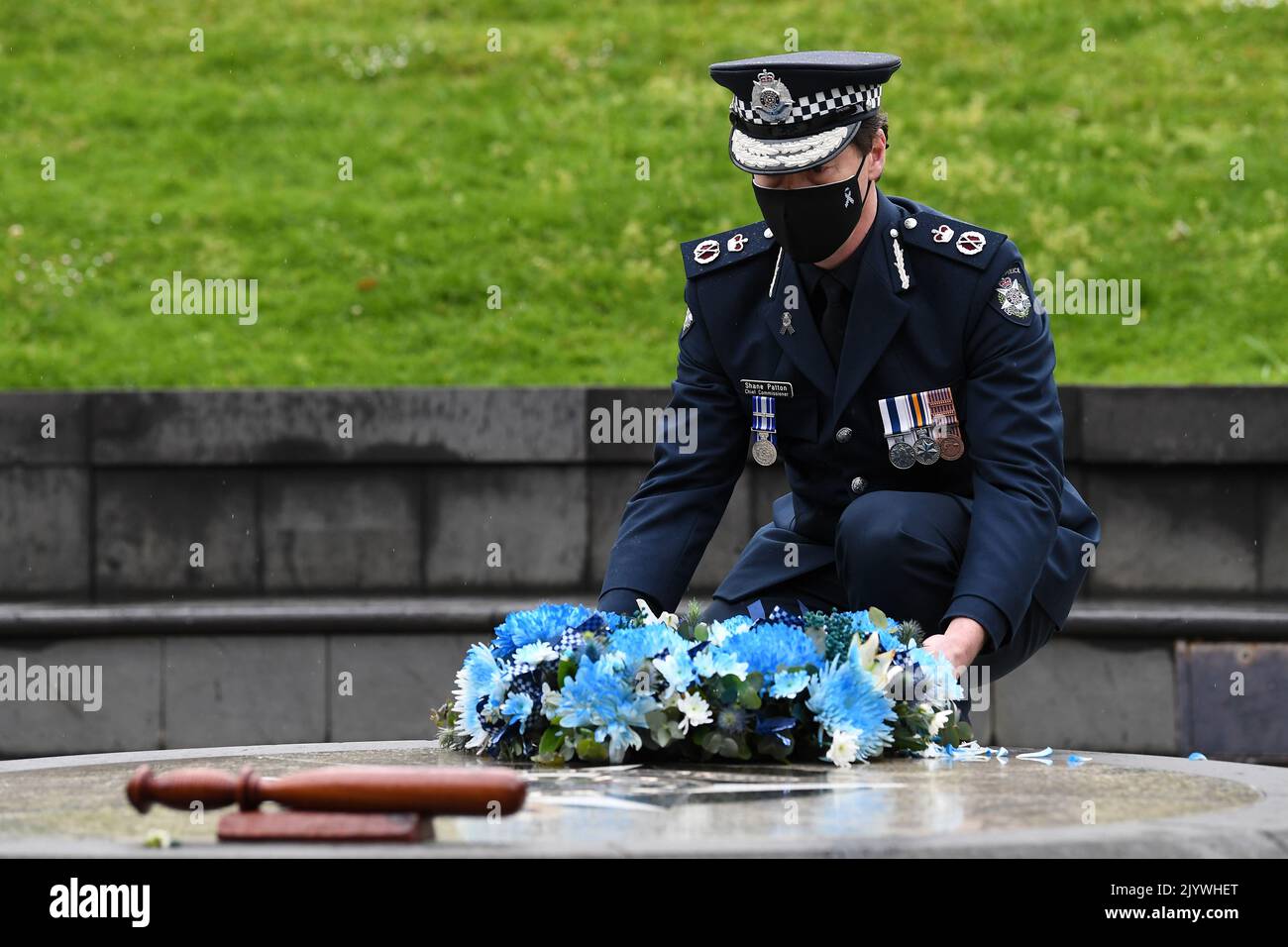 Victoria Police Commissioner Shane Patton lays a wreath during a ...