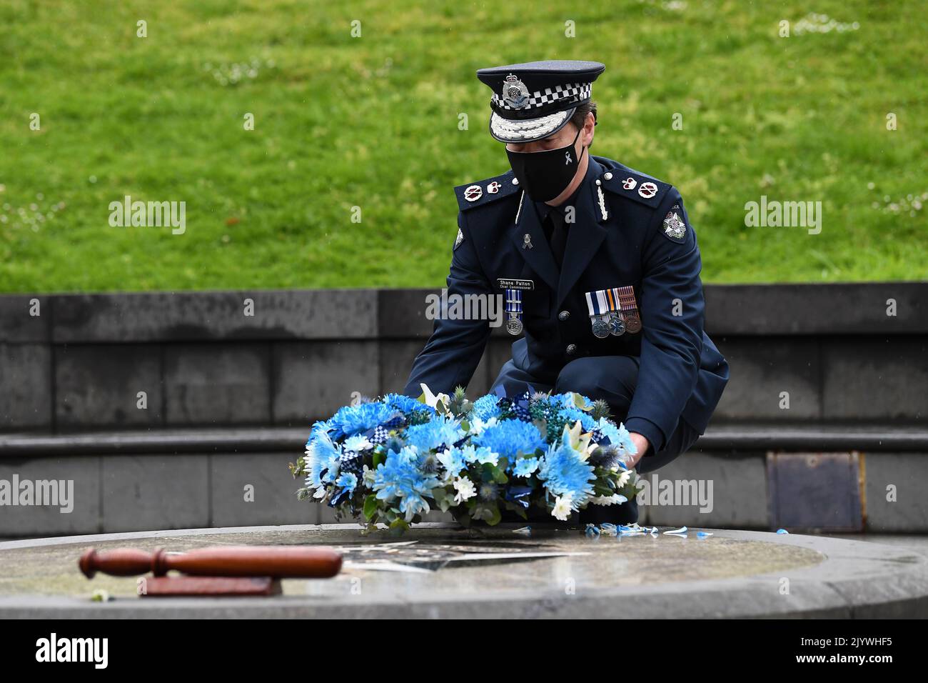Victoria Police Commissioner Shane Patton lays a wreath during a ...