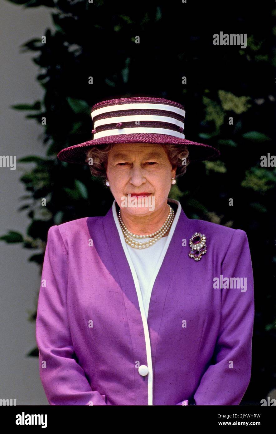 Queen Elizabeth II of Great Britain, center, speaks to guests in the ...