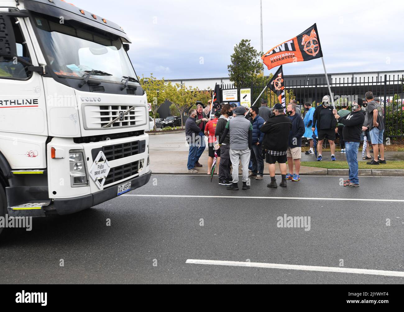 Members of the Transport Workers Union (TWU) are seen protesting ...