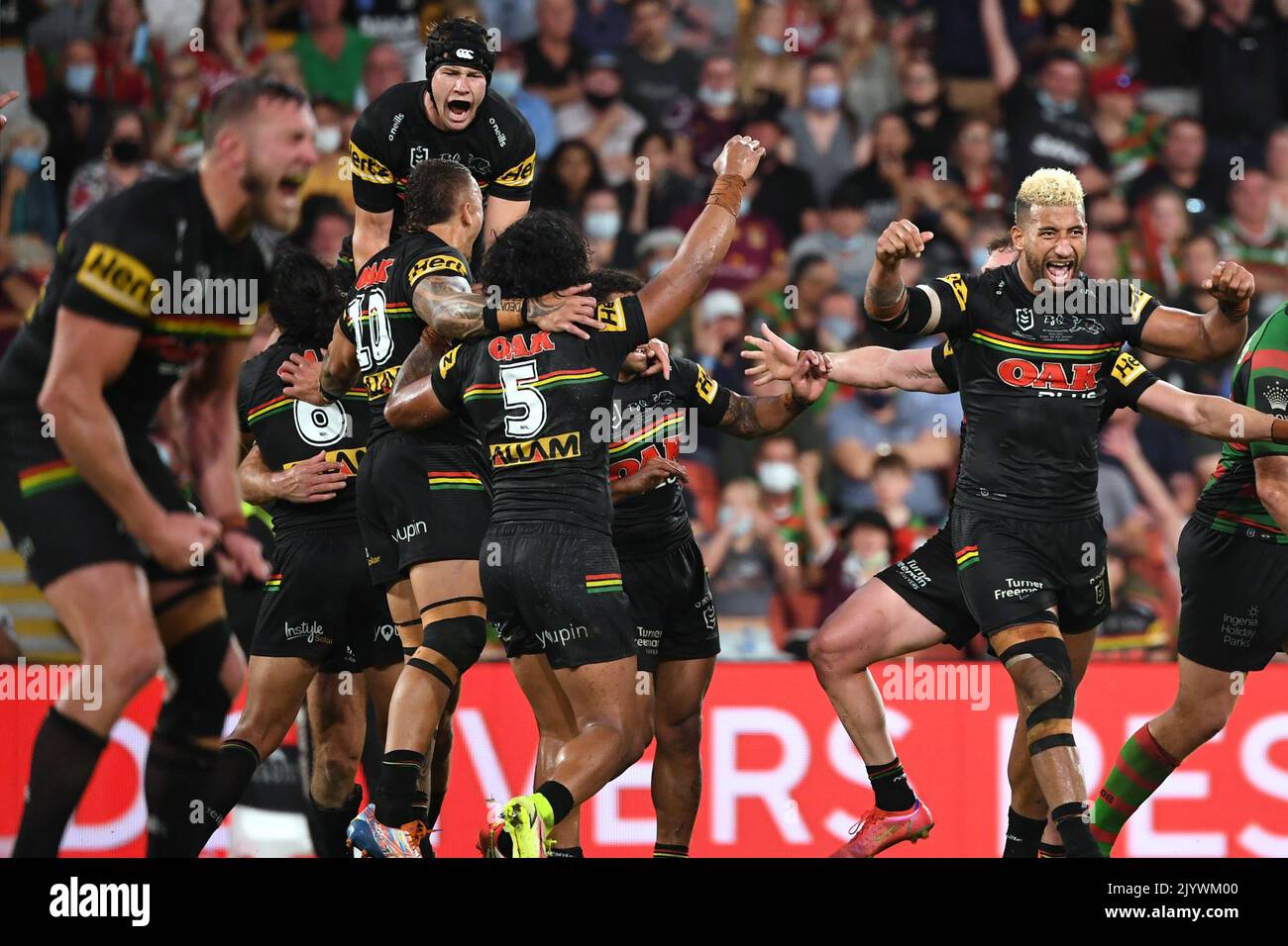 Panthers players celebrate after winning the NRL Grand Final between ...