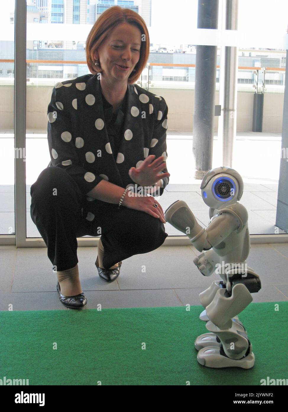 Deputy Prime Minister Julia Gillard enjoys a dancing robot performance ...