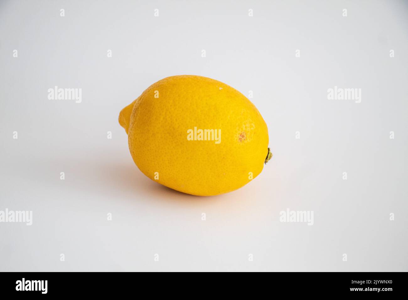 Lemon on the isolated white background, selective focus, noise effect ...