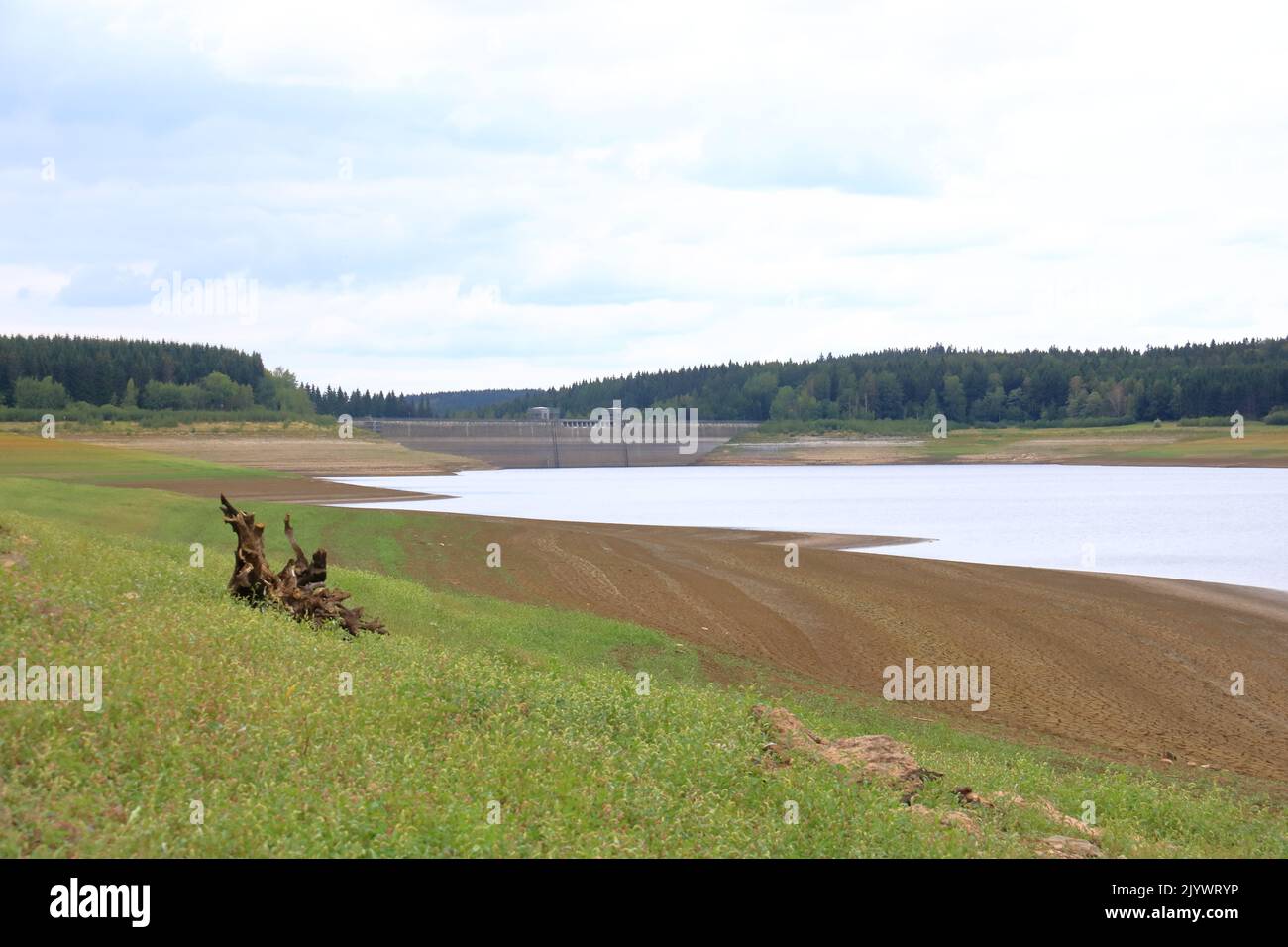 dried up empty reservoir and dam during a summer heatwave, low rainfall ...