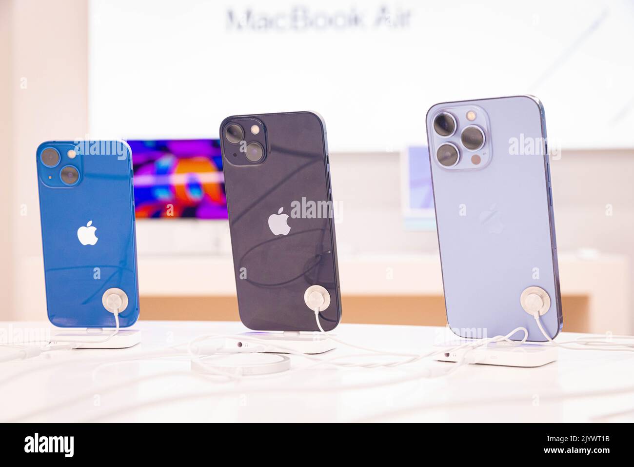 Apple’s iPhone 13 lineup on display inside an electronics store in ...