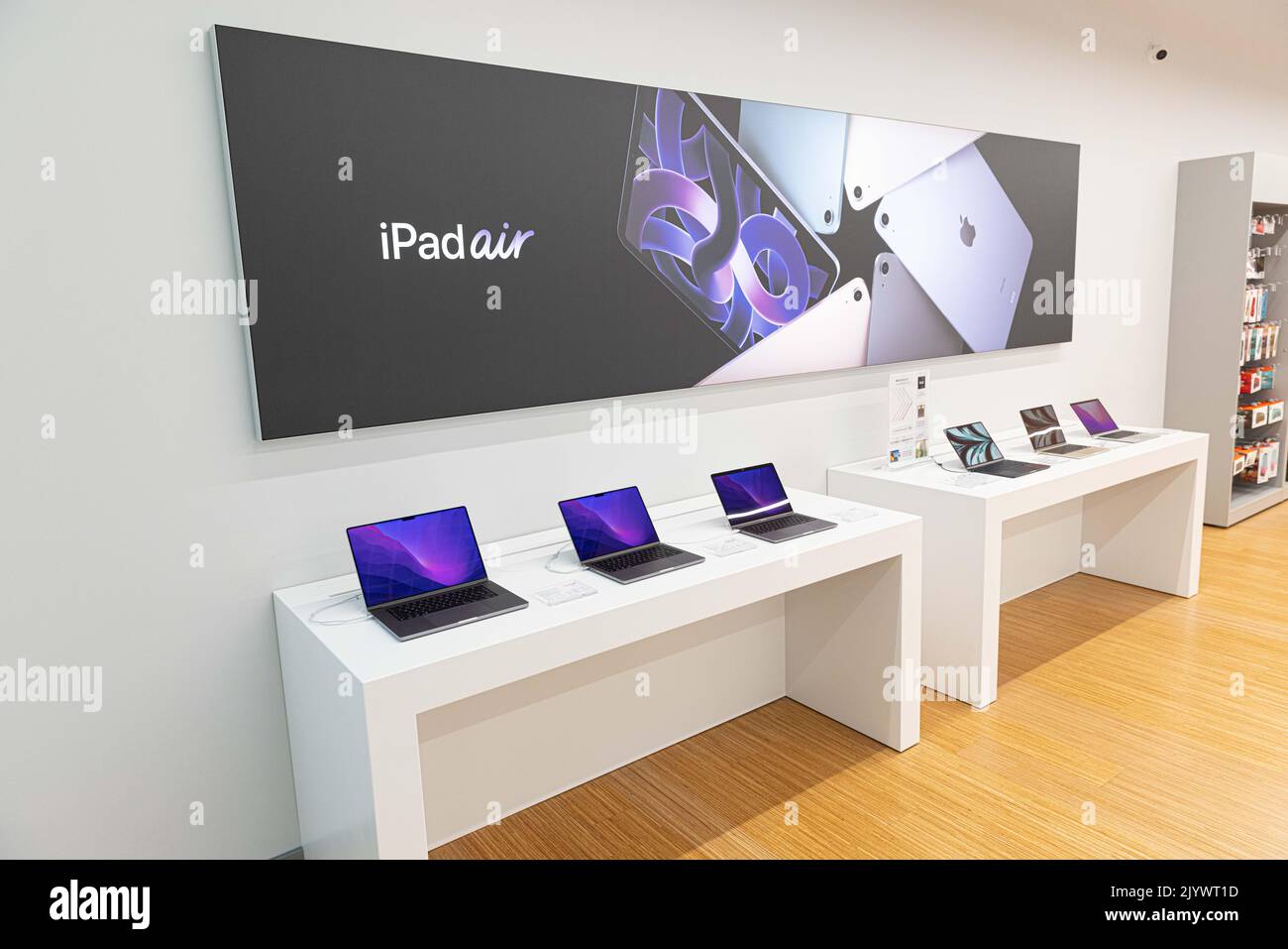 Apple laptops seen on display inside an electronics store in Bratislava ...
