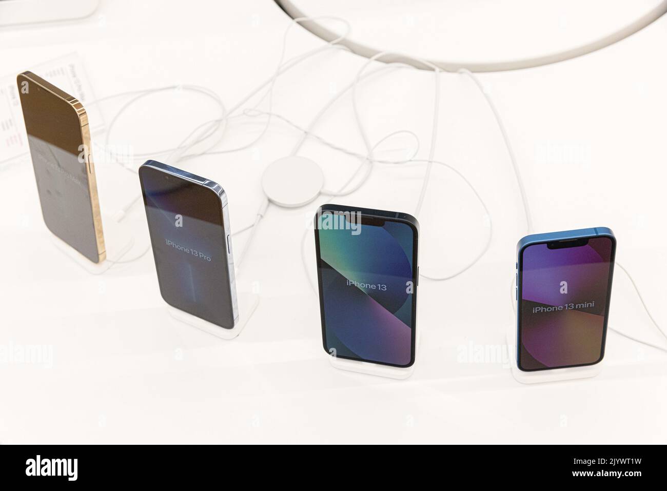 Apple’s iPhone 13 lineup on display inside an electronics store in ...