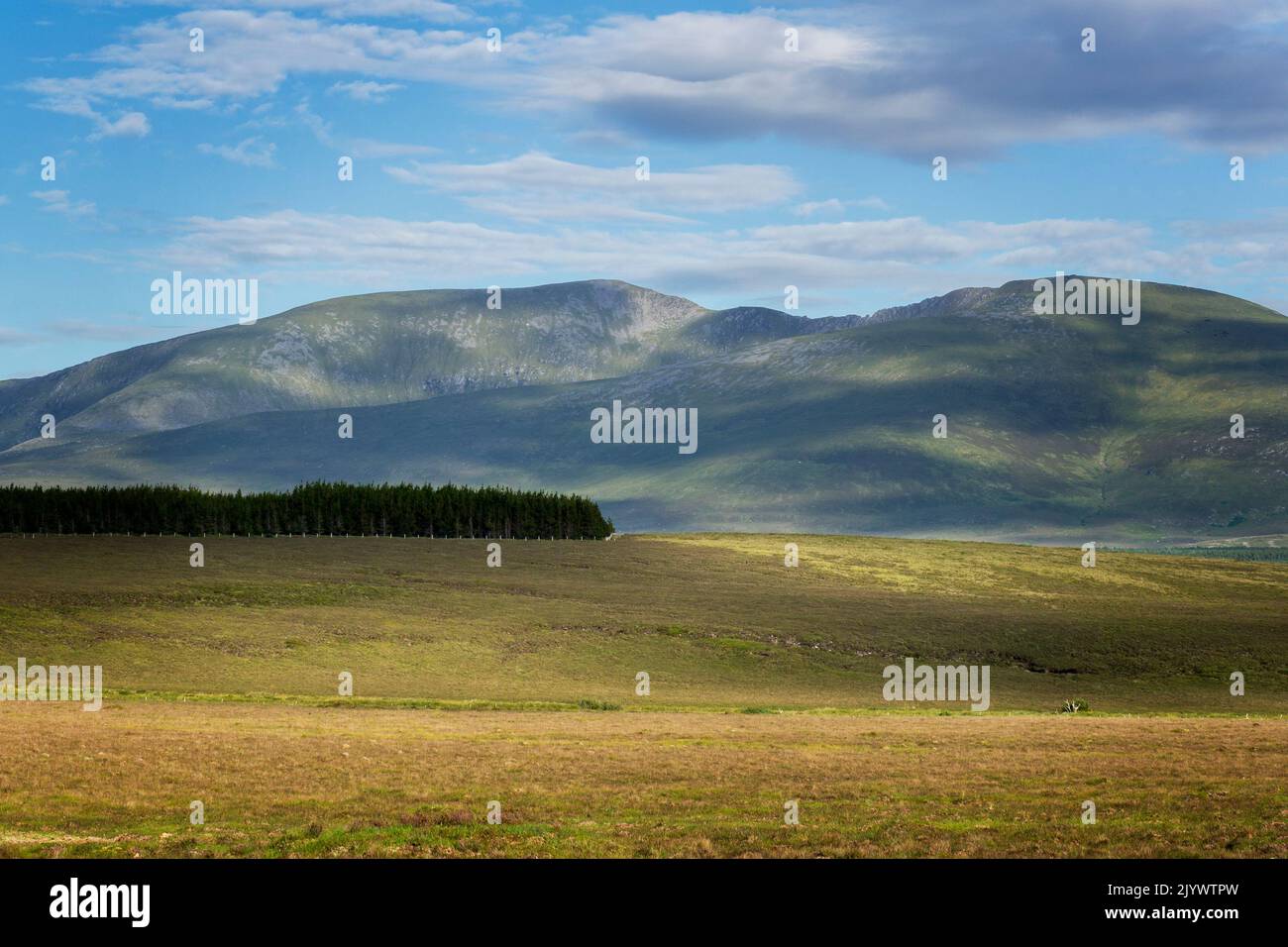 Rolling hills and mountains in north west Ireland. In the background ...