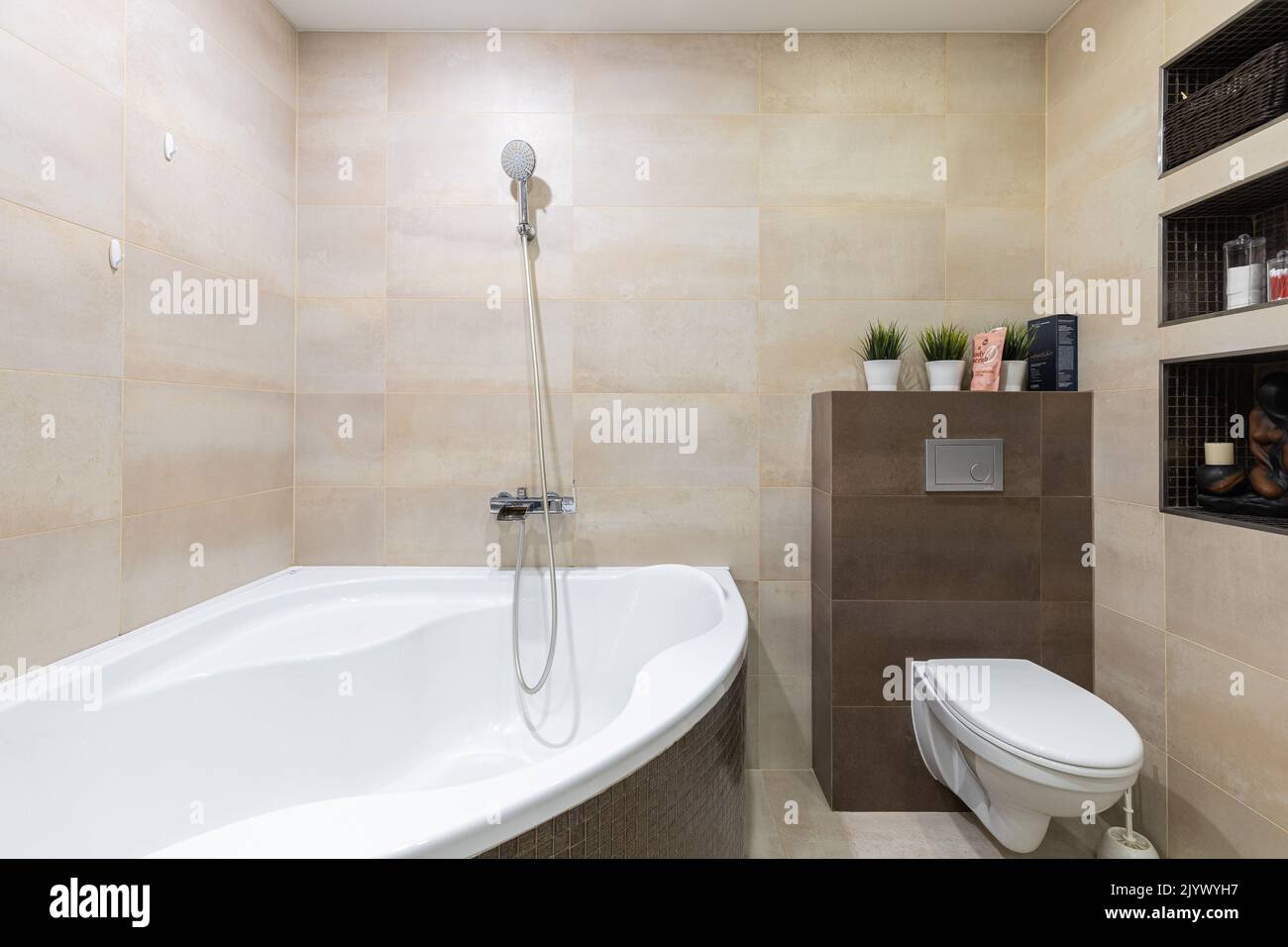 Jacuzzi and shower in the bathroom in the apartment Stock Photo - Alamy