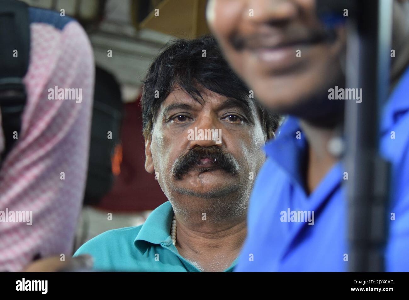 Portrait of indian man in street Stock Photo - Alamy