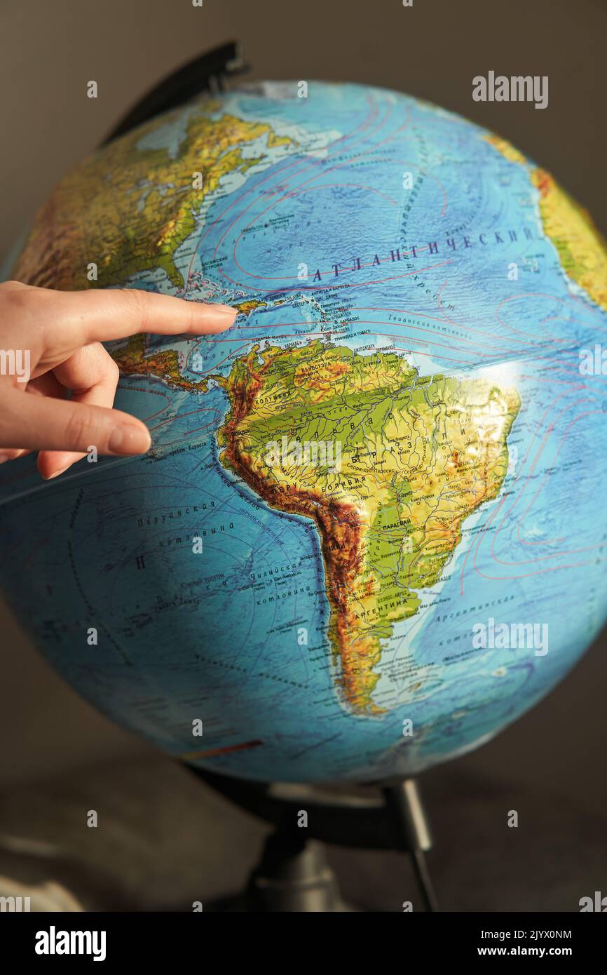 Finger pointing on map hi-res stock photography and images - Alamy