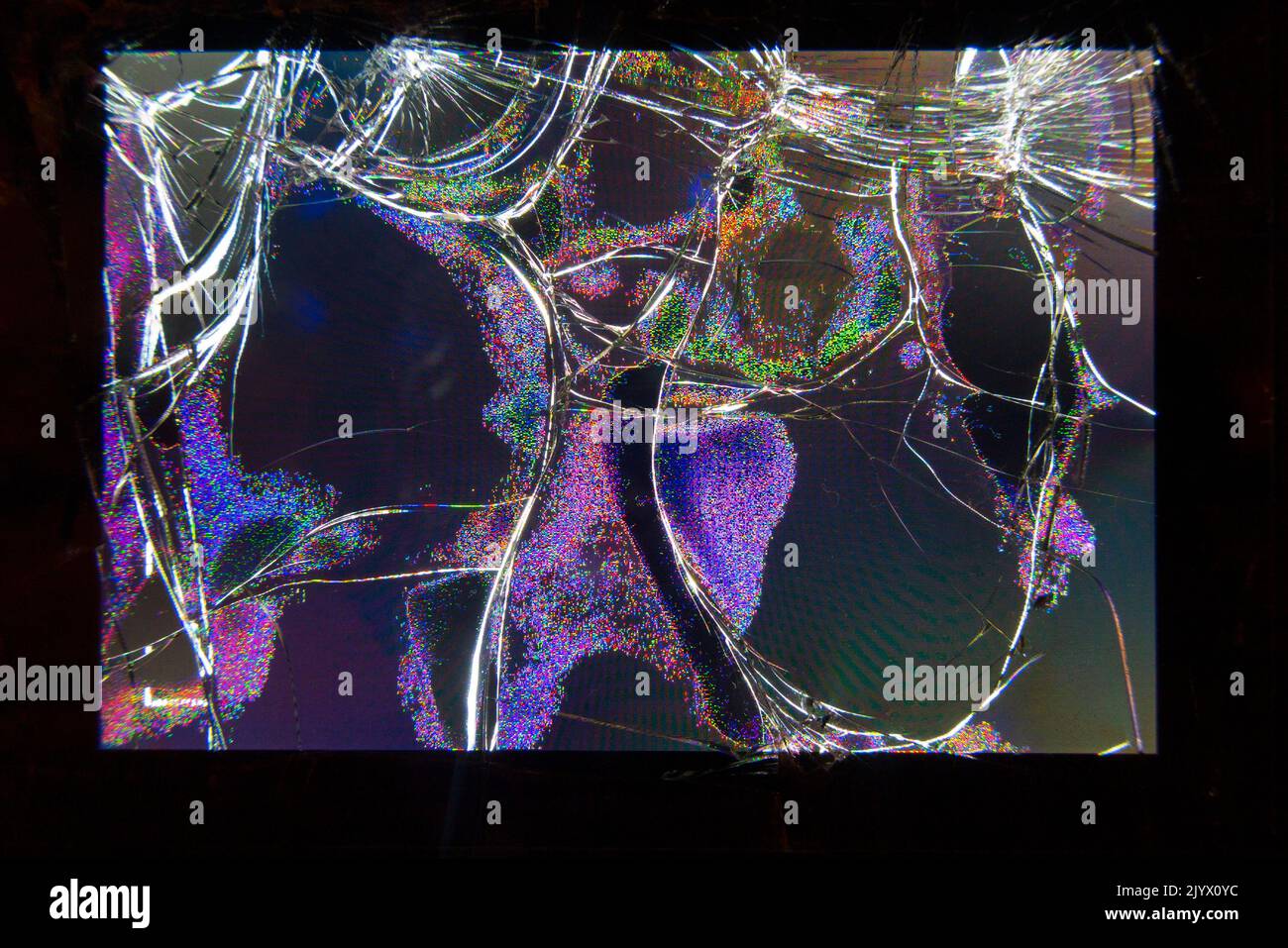 Broken and shattered LCD screen on the rear of a compact photographic ...
