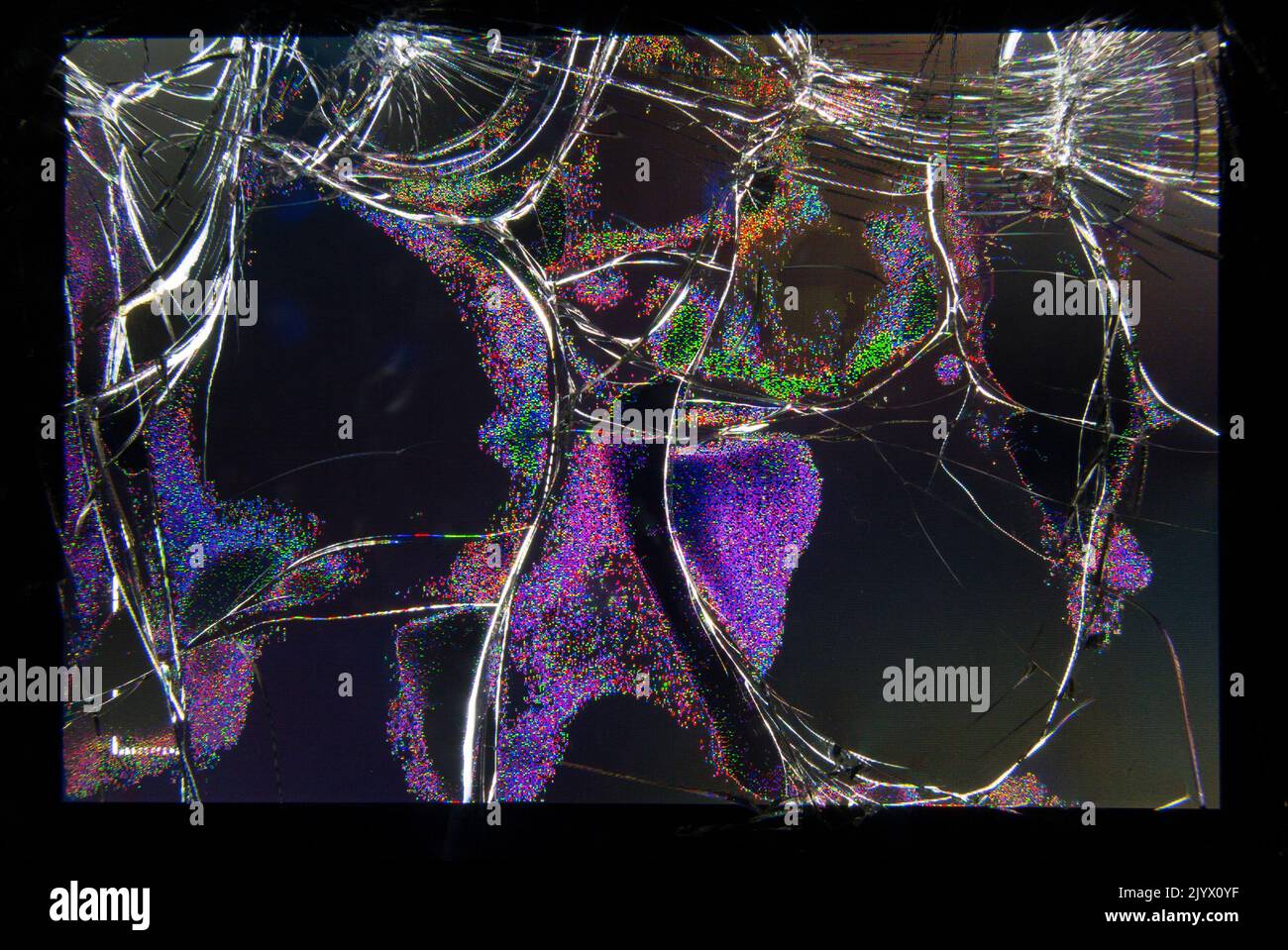 Broken and shattered LCD screen on the rear of a compact photographic ...