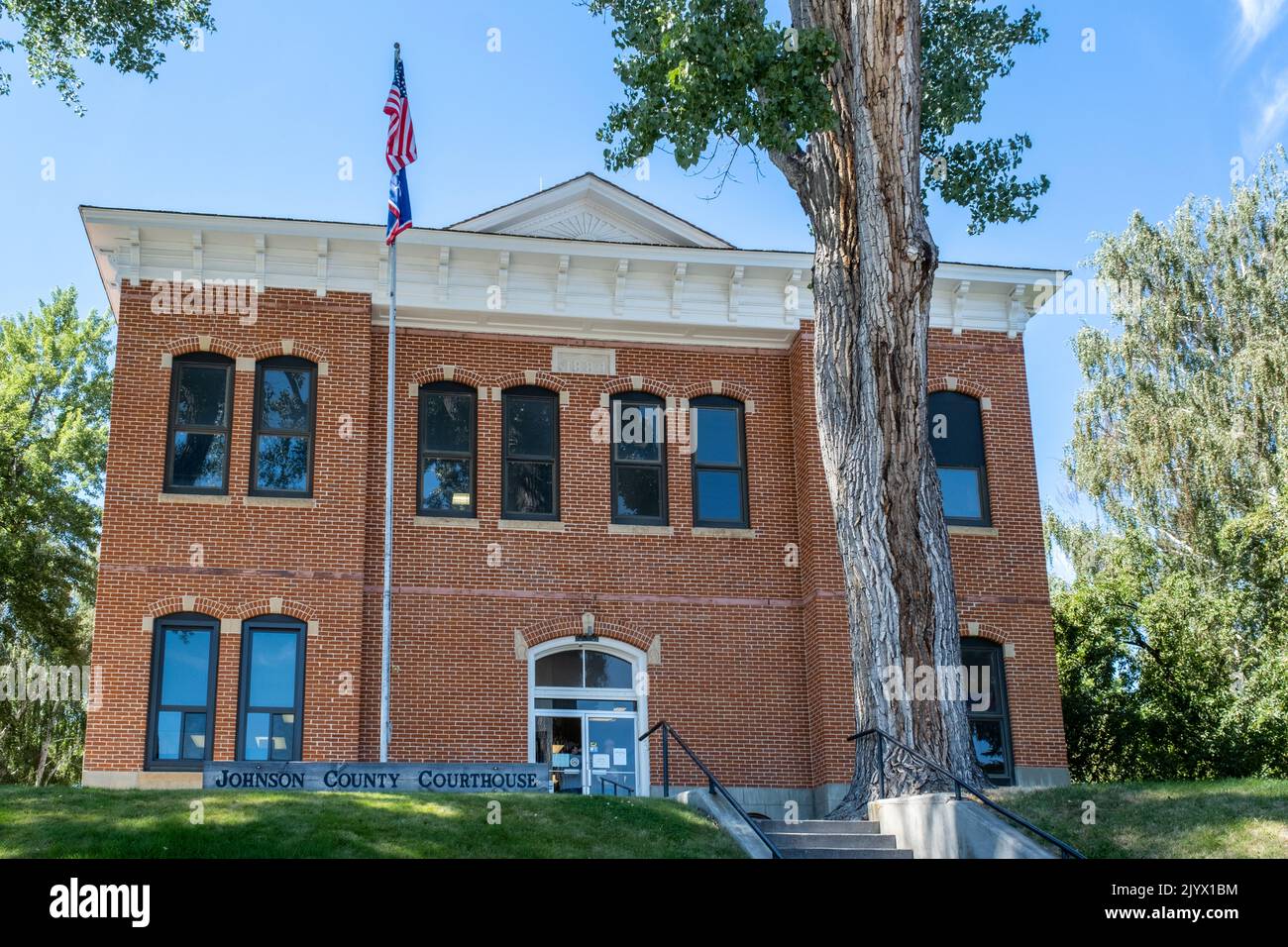 Historic courthouse in Johnson county Wyoming built in 1884 of red ...