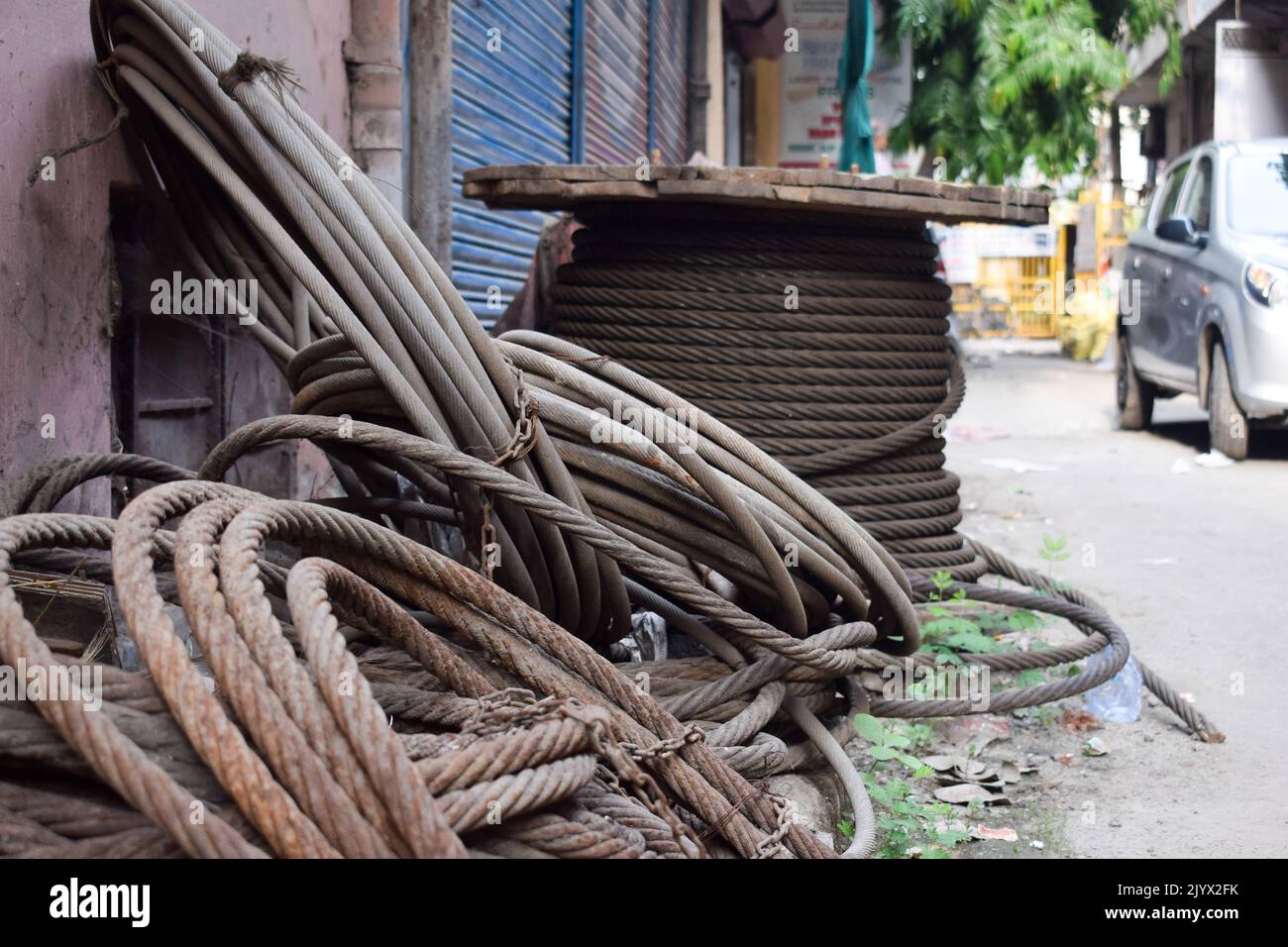 Metallic cable near the road Stock Photo - Alamy