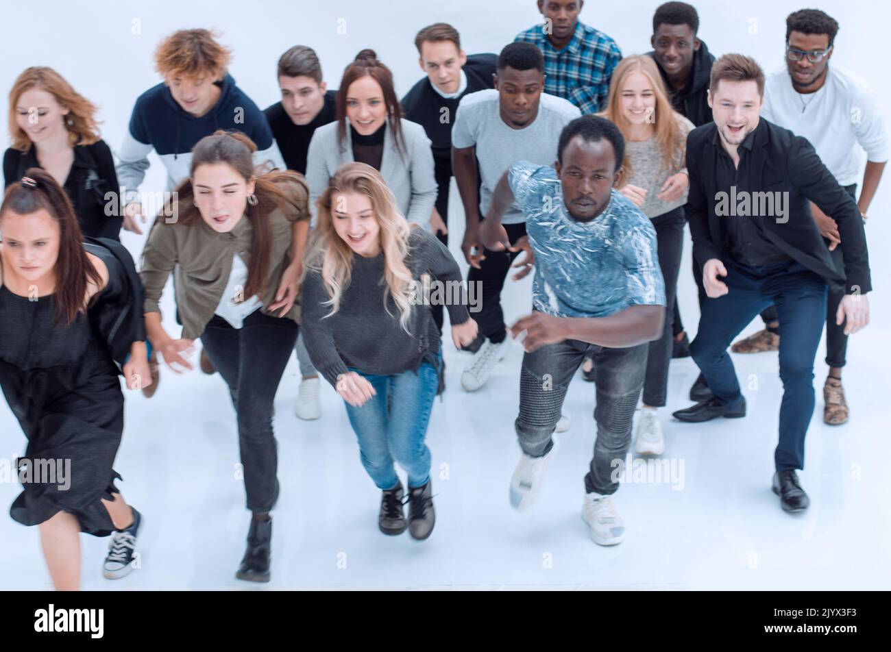 large group of diverse young people starting forward Stock Photo - Alamy