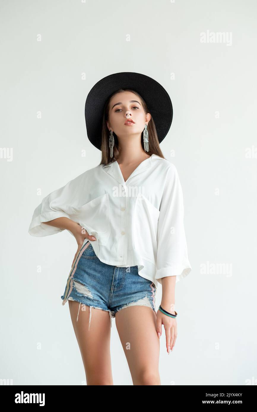 trend summer look model posing confident woman Stock Photo - Alamy