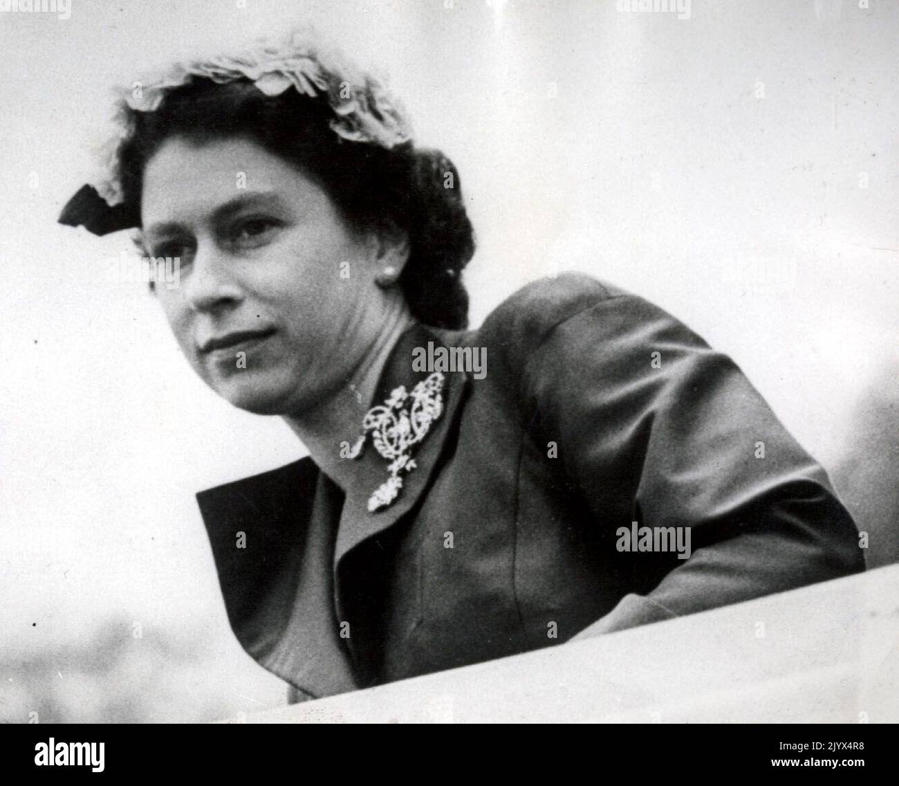 File photo dated 13/05/1956 of Queen Elizabeth II leaning across the ...
