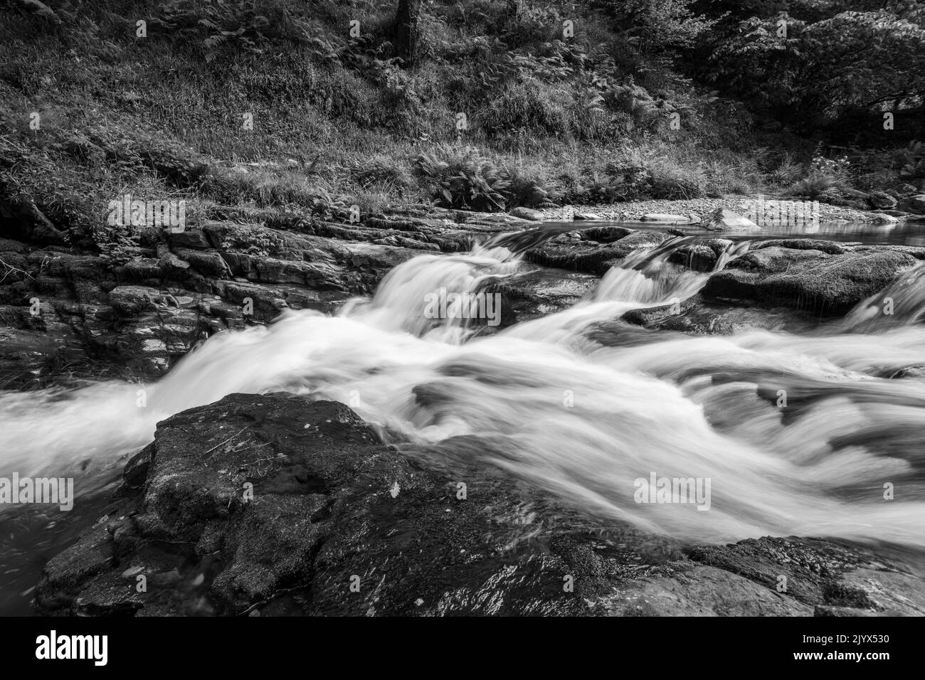 Long exposure of the Watersmeet Bridge waterfall on the East Lyn river ...