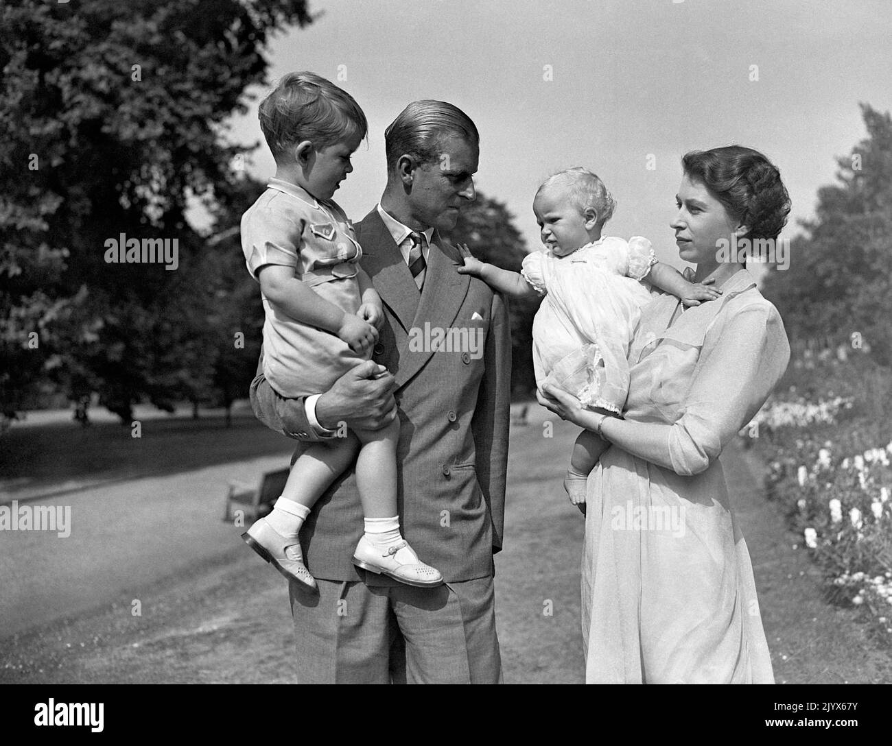 File photo dated 09/08/1951 of Princess Anne in the arms of Princess ...