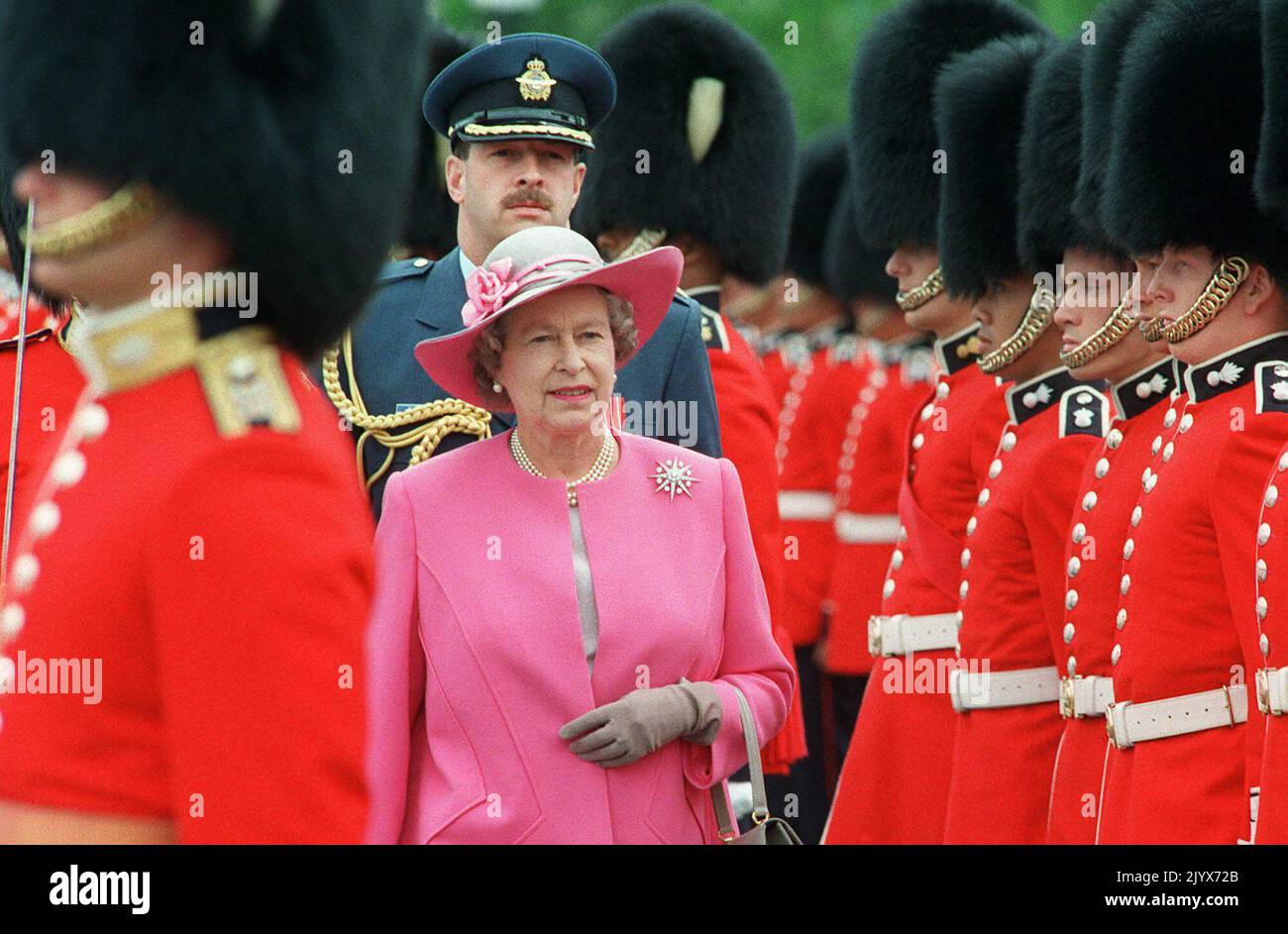 Queen Elizabeth II insoects the Cremonial Guard on Parliament Hill ...