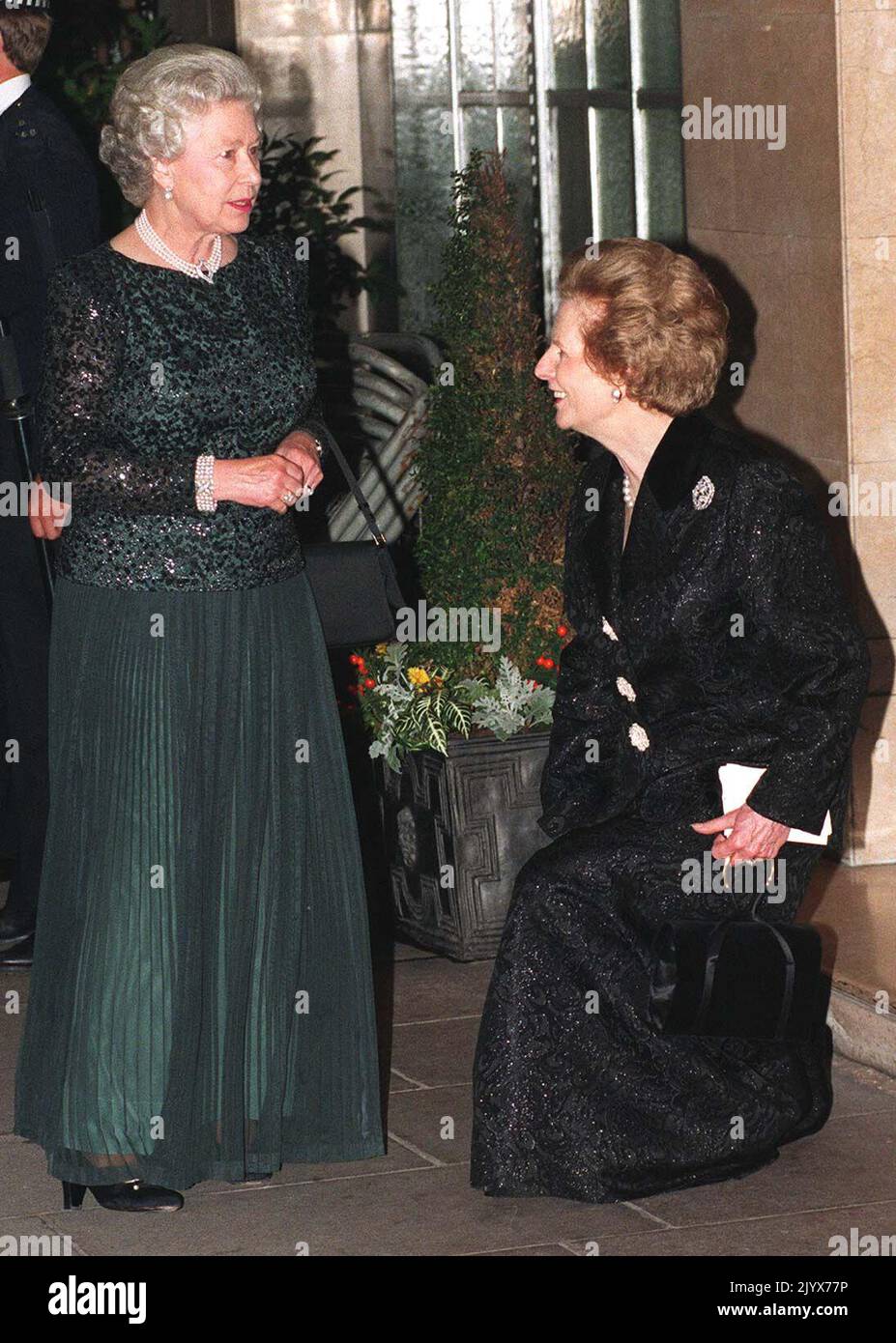 File photo dated 17/10/1995 of Baroness Thatcher curtsying to Queen ...