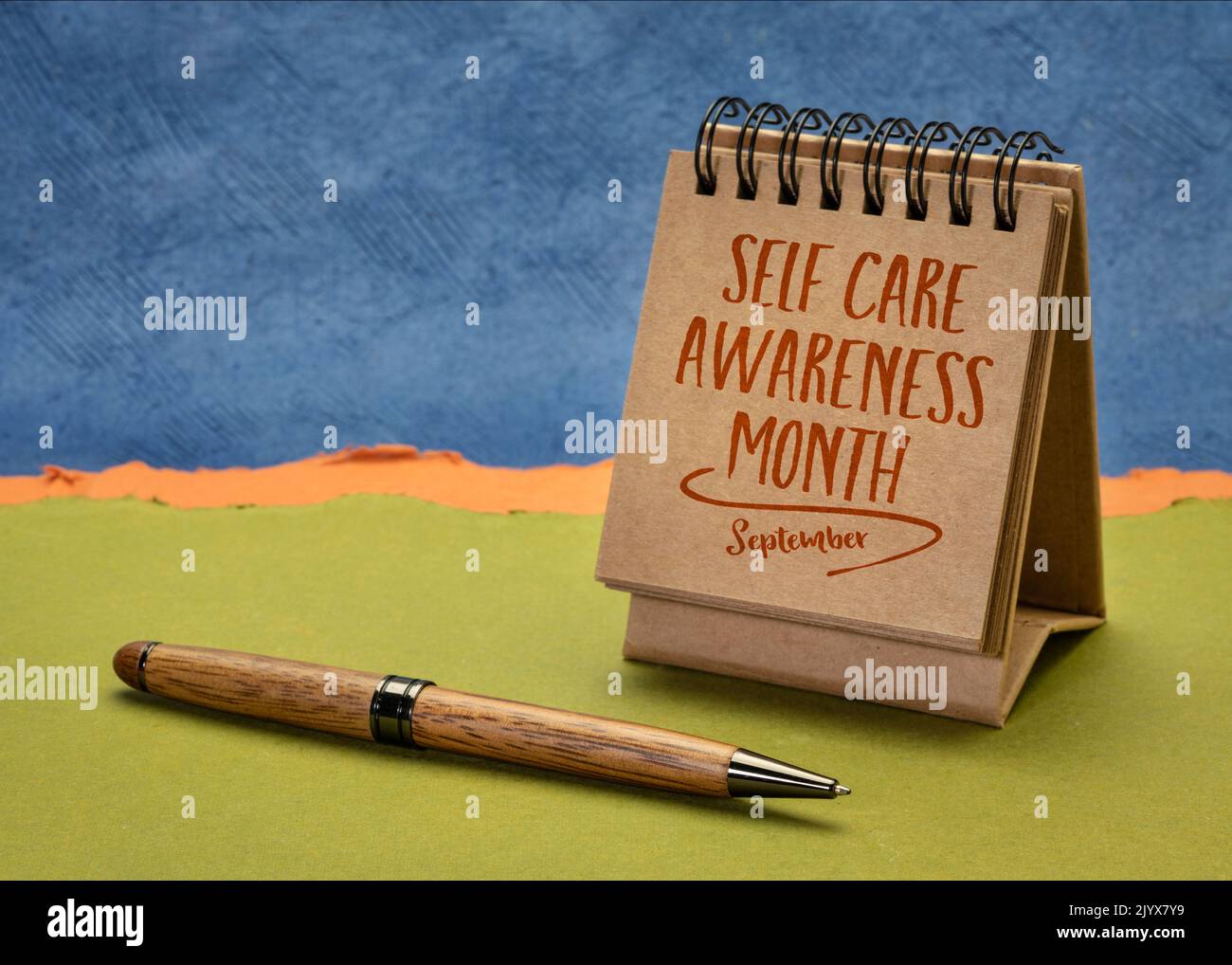 Self Care Awareness Month, September - handwriting in a small desktop ...
