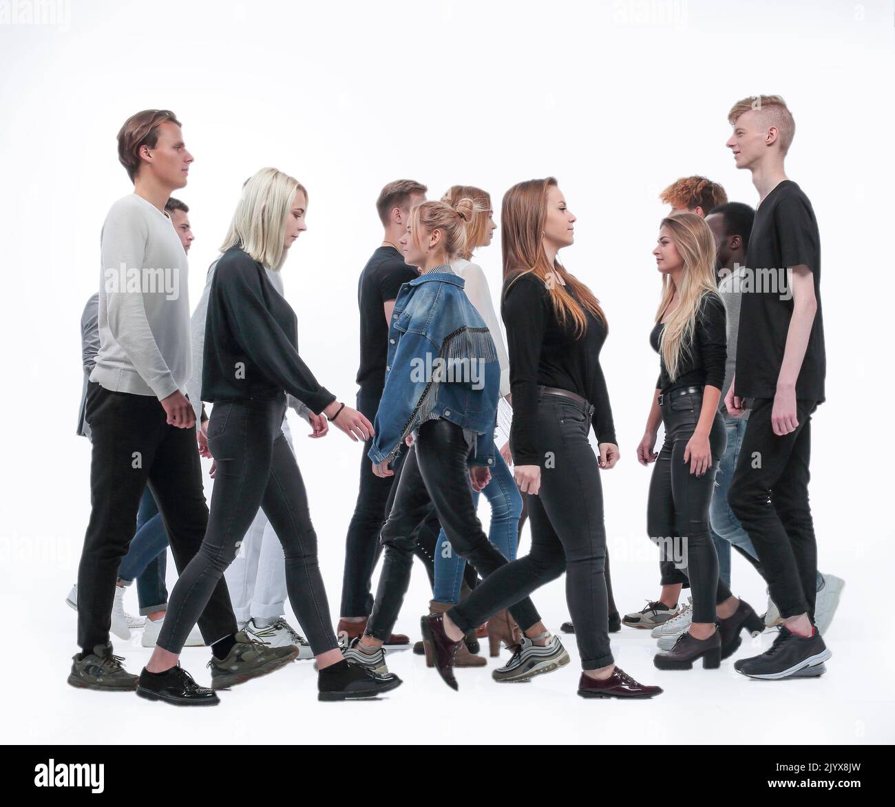 casual young people walking in different directions Stock Photo - Alamy