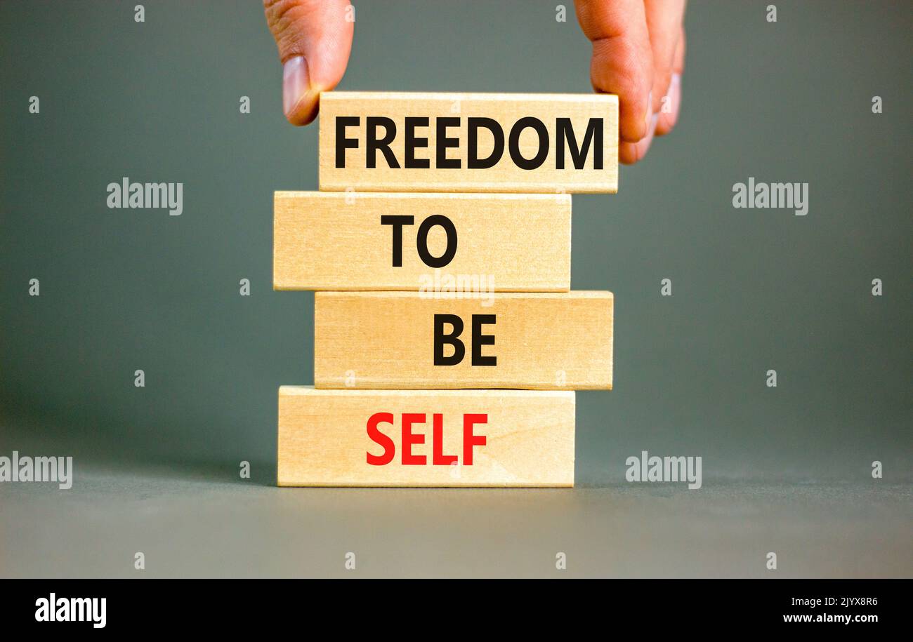 Freedom to be self symbol. Concept words Freedom to be self on wooden ...