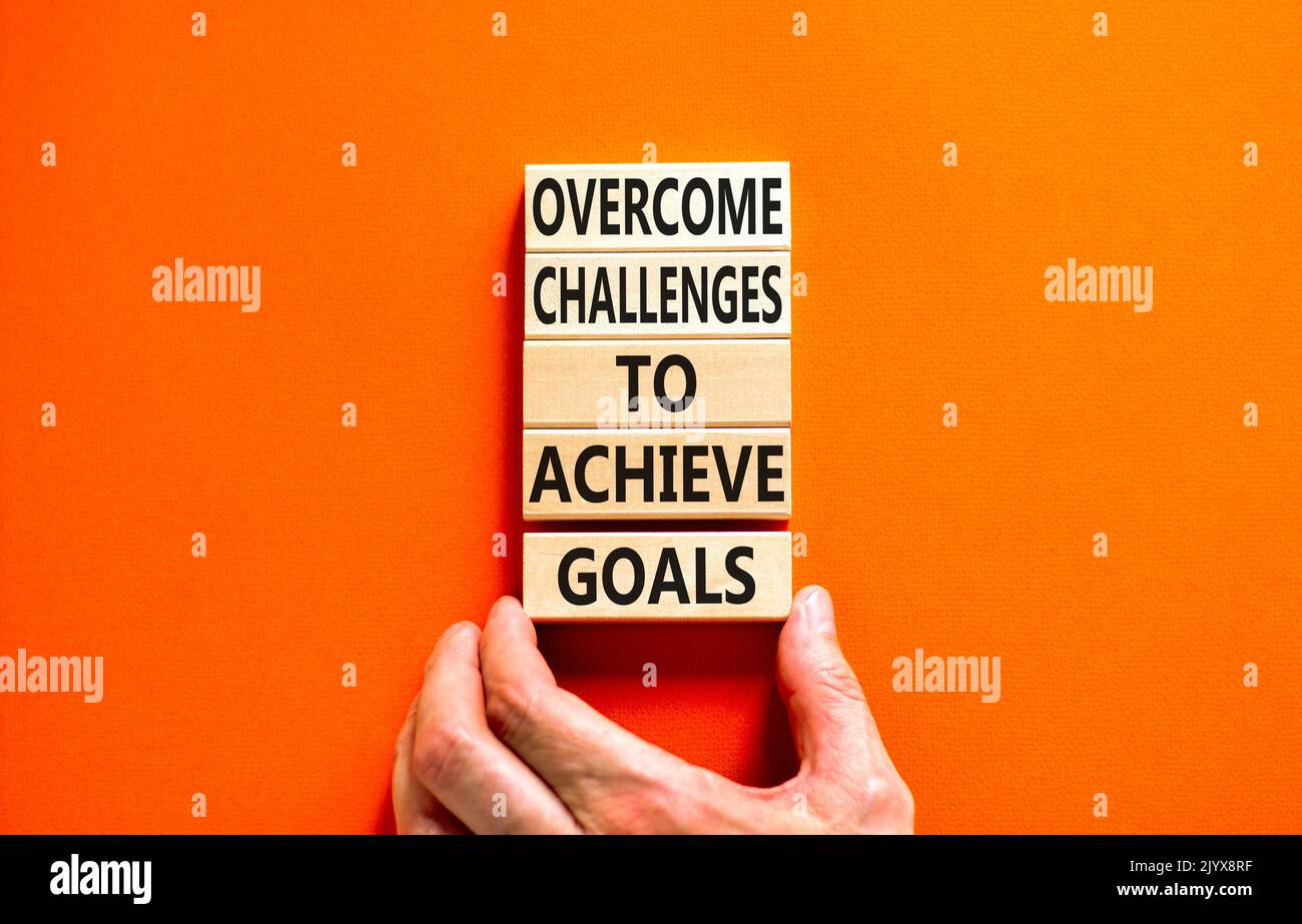 Overcome challenges to achieve goals symbol. Concept words Overcome ... Overcome challenges to achieve goals symbol. Concept words Overcome ...