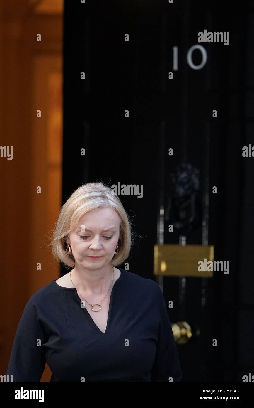 Prime Minister Liz Truss walks from the door of 10 Downing Street ...